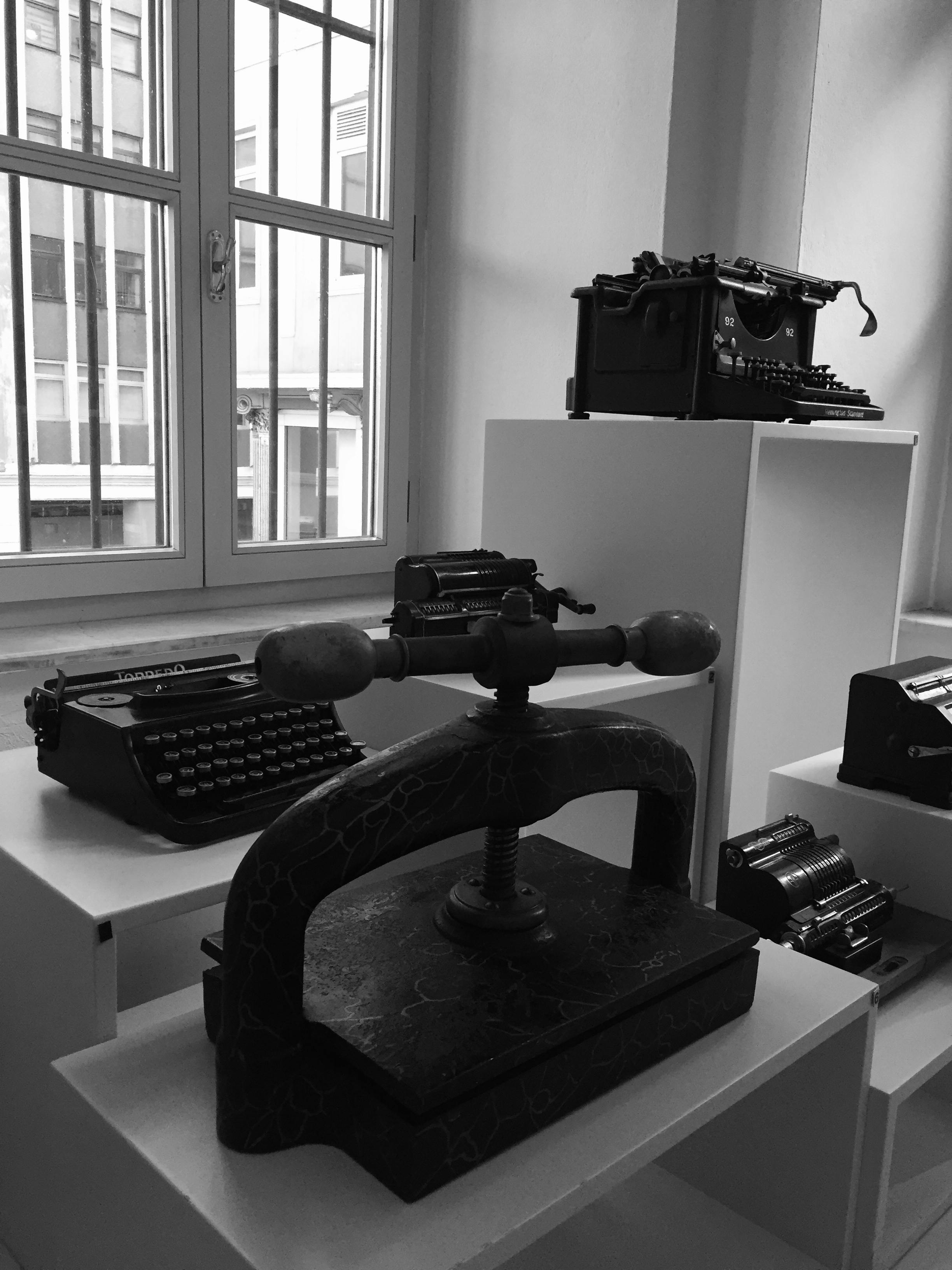 Grayscale Photography of Typewriter and a Sealer on Table · Free Stock ...