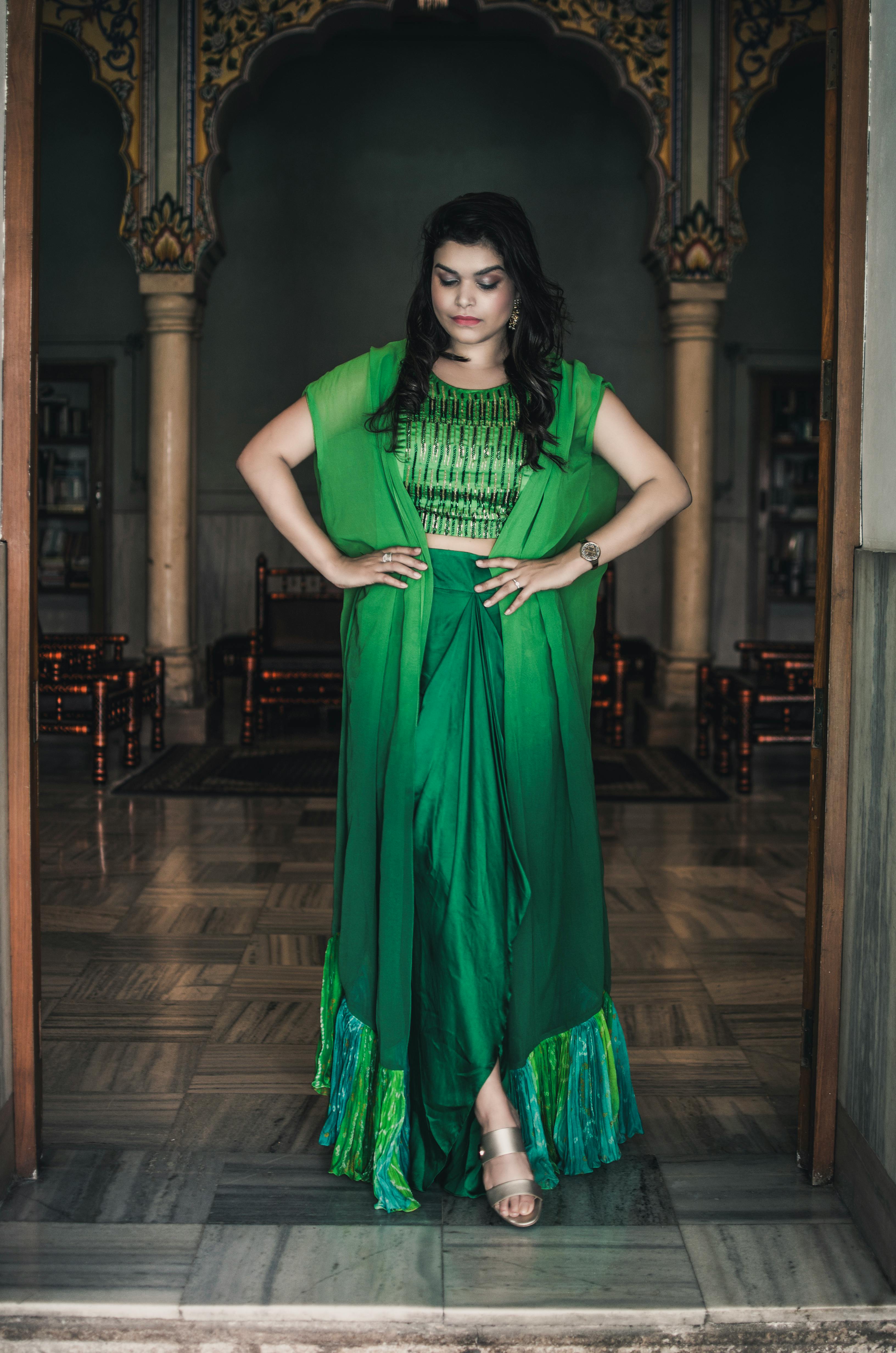 A Woman Wearing a Green Sari · Free Stock Photo