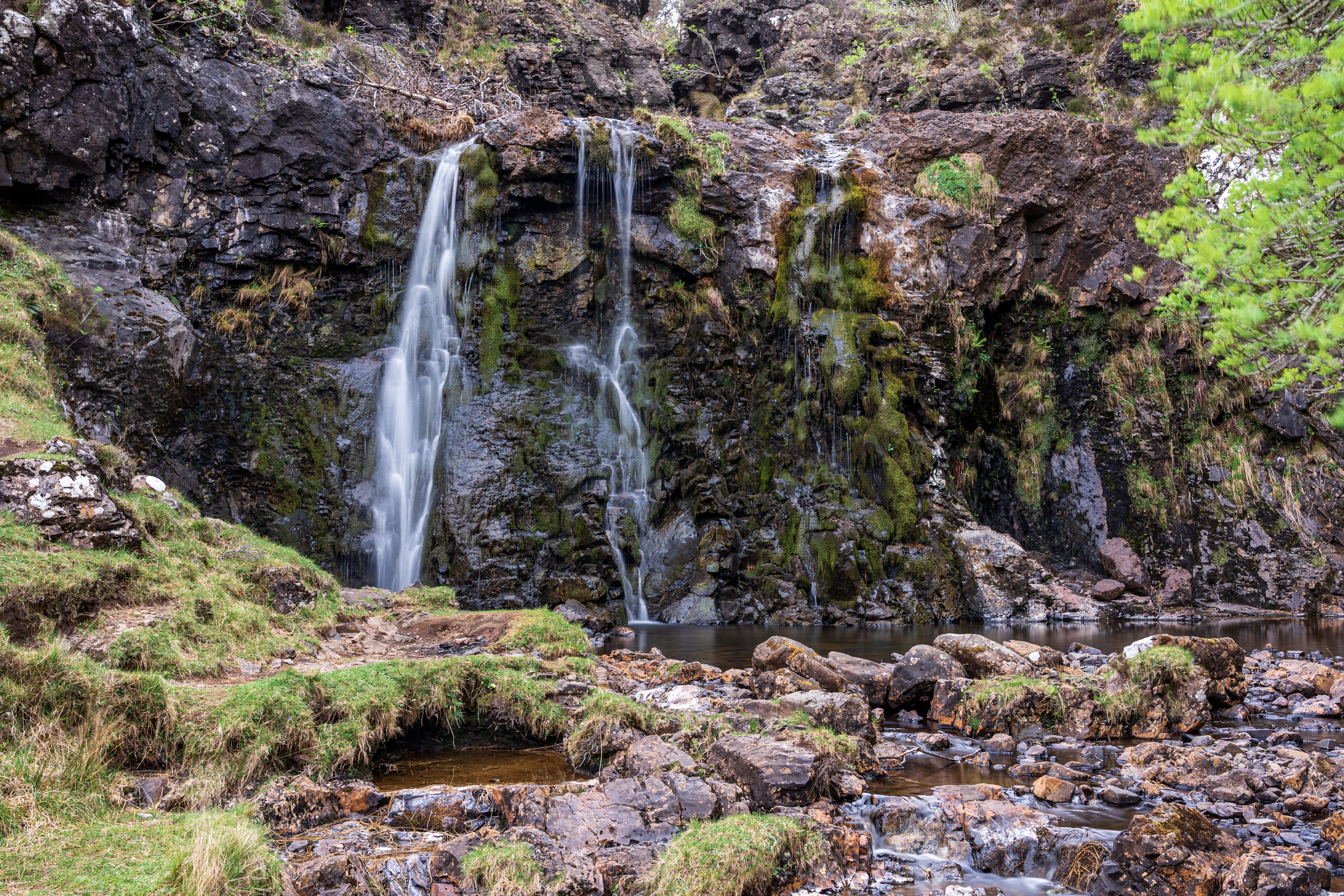Eroded Rock Formation with Waterfall · Free Stock Photo