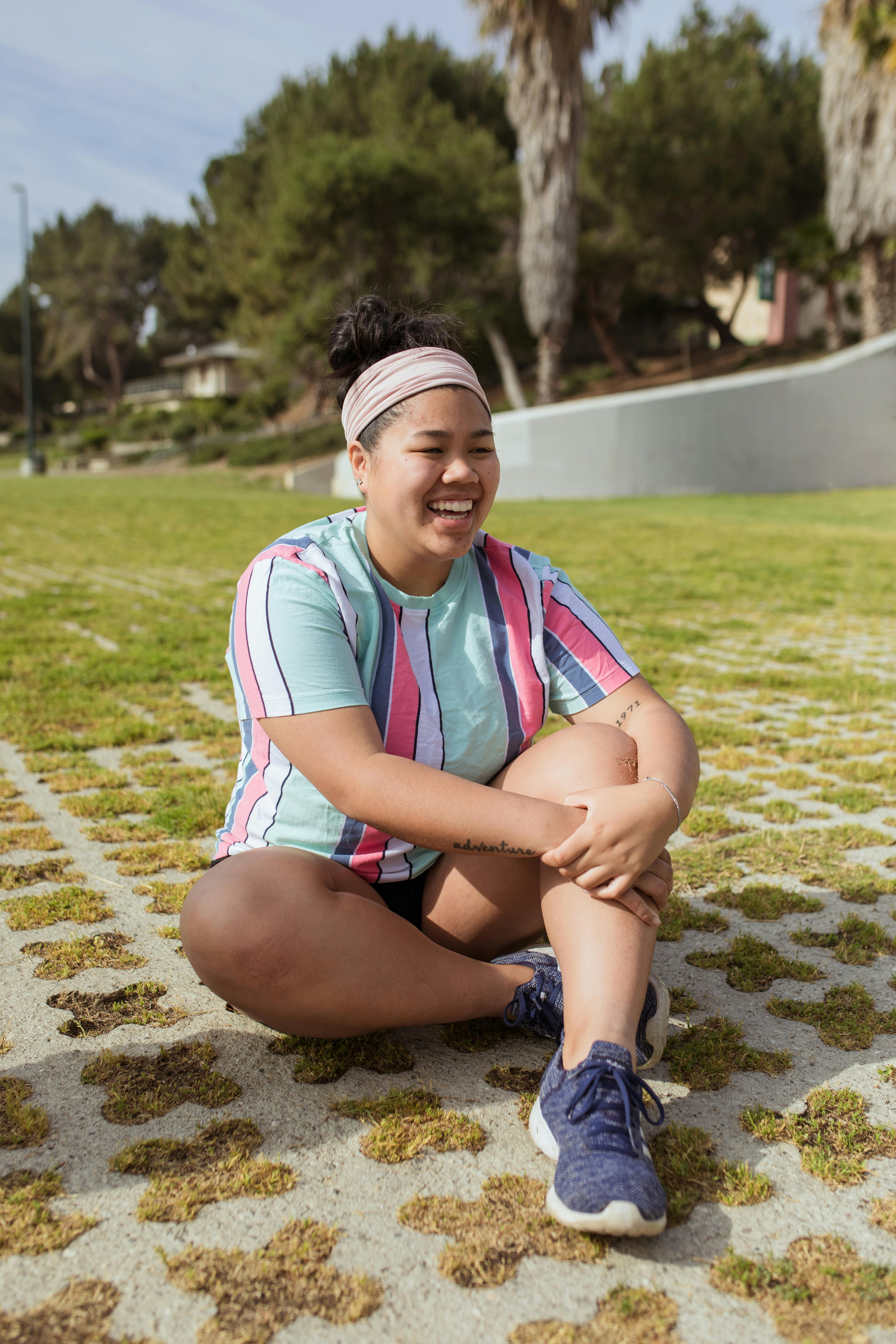 Photo of Woman Sitting on Ground · Free Stock Photo