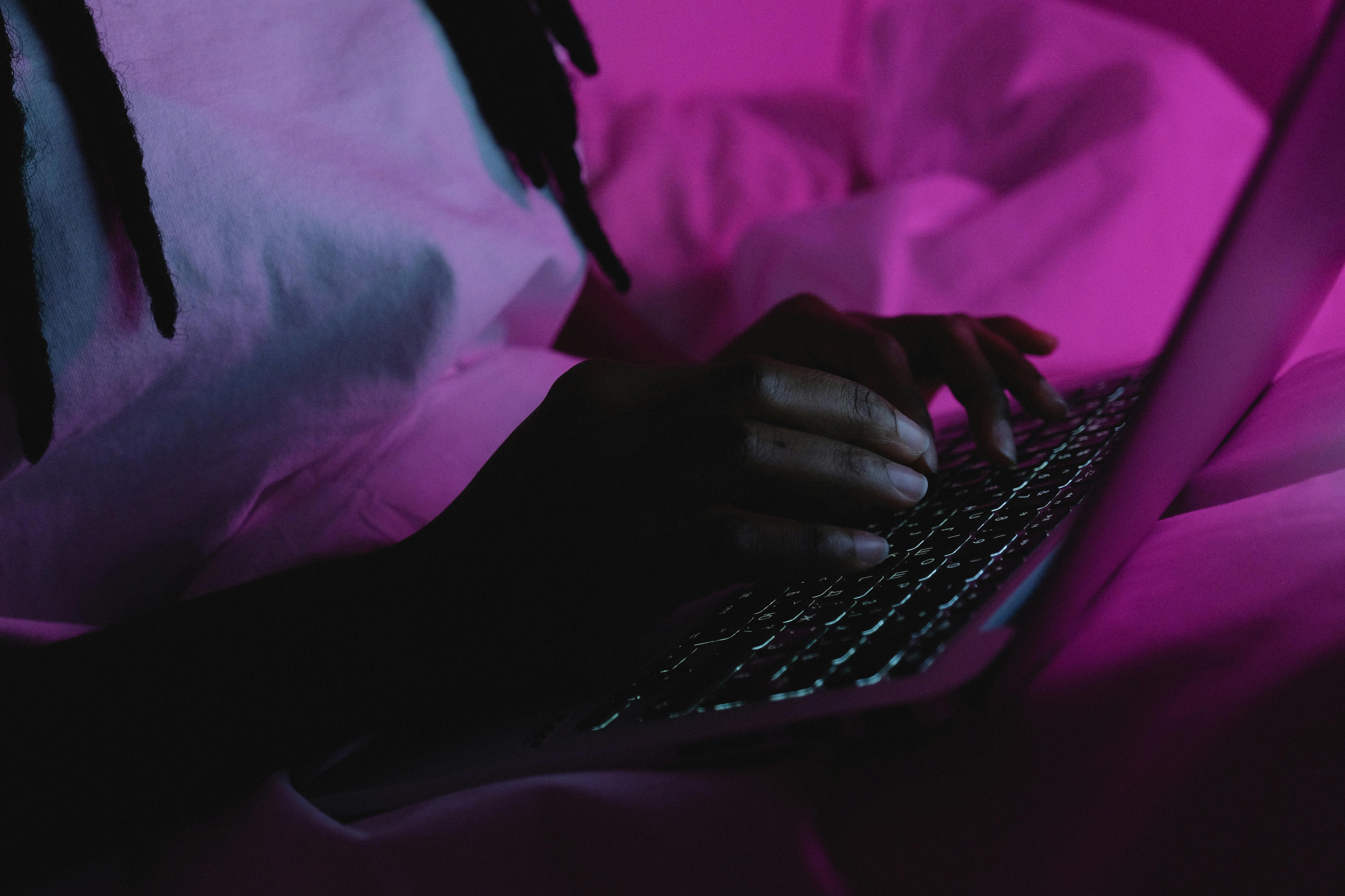 Person Using Black and Red Laptop Computer · Free Stock Photo