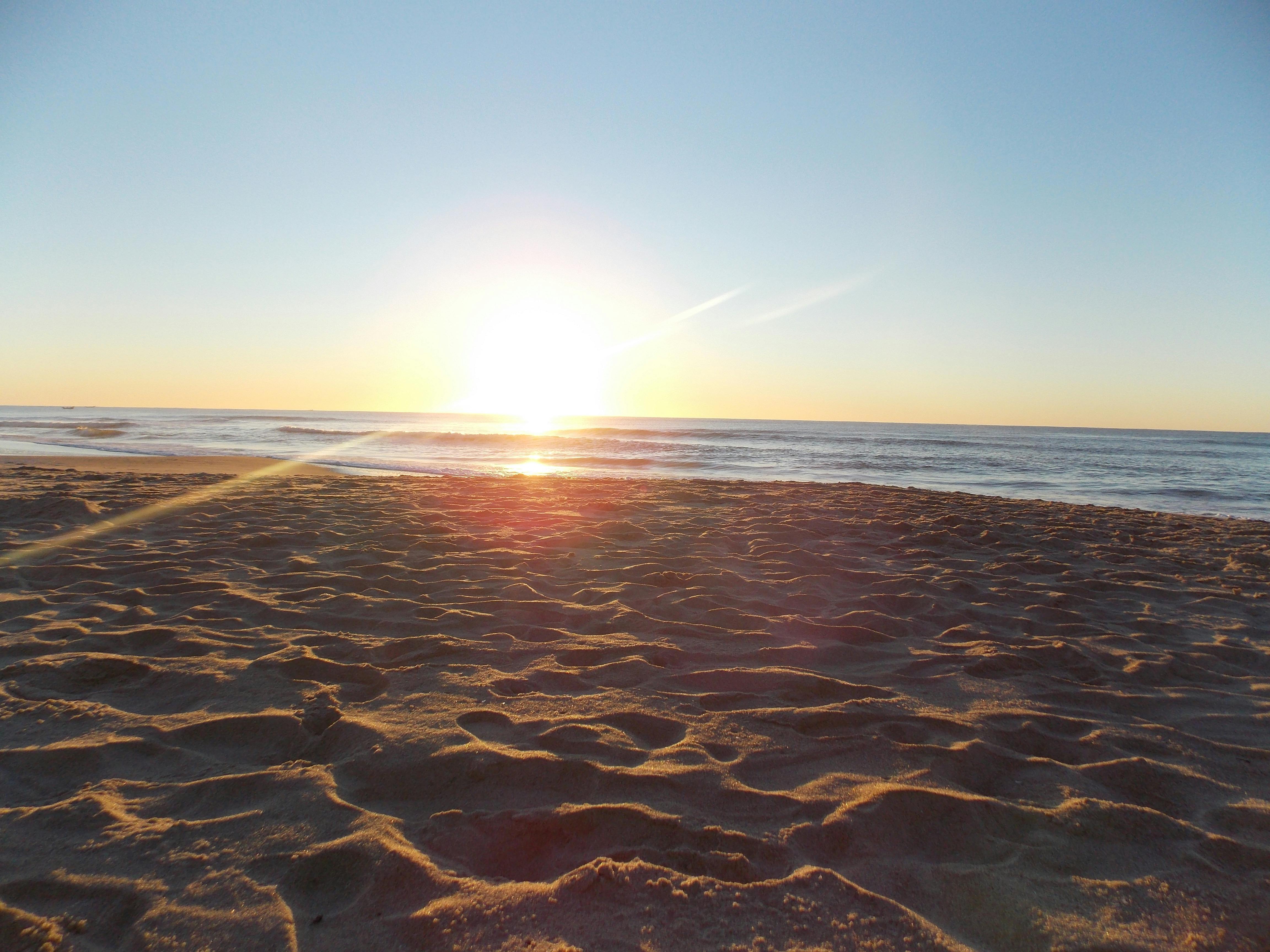 Free stock photo of sun rising on the beach