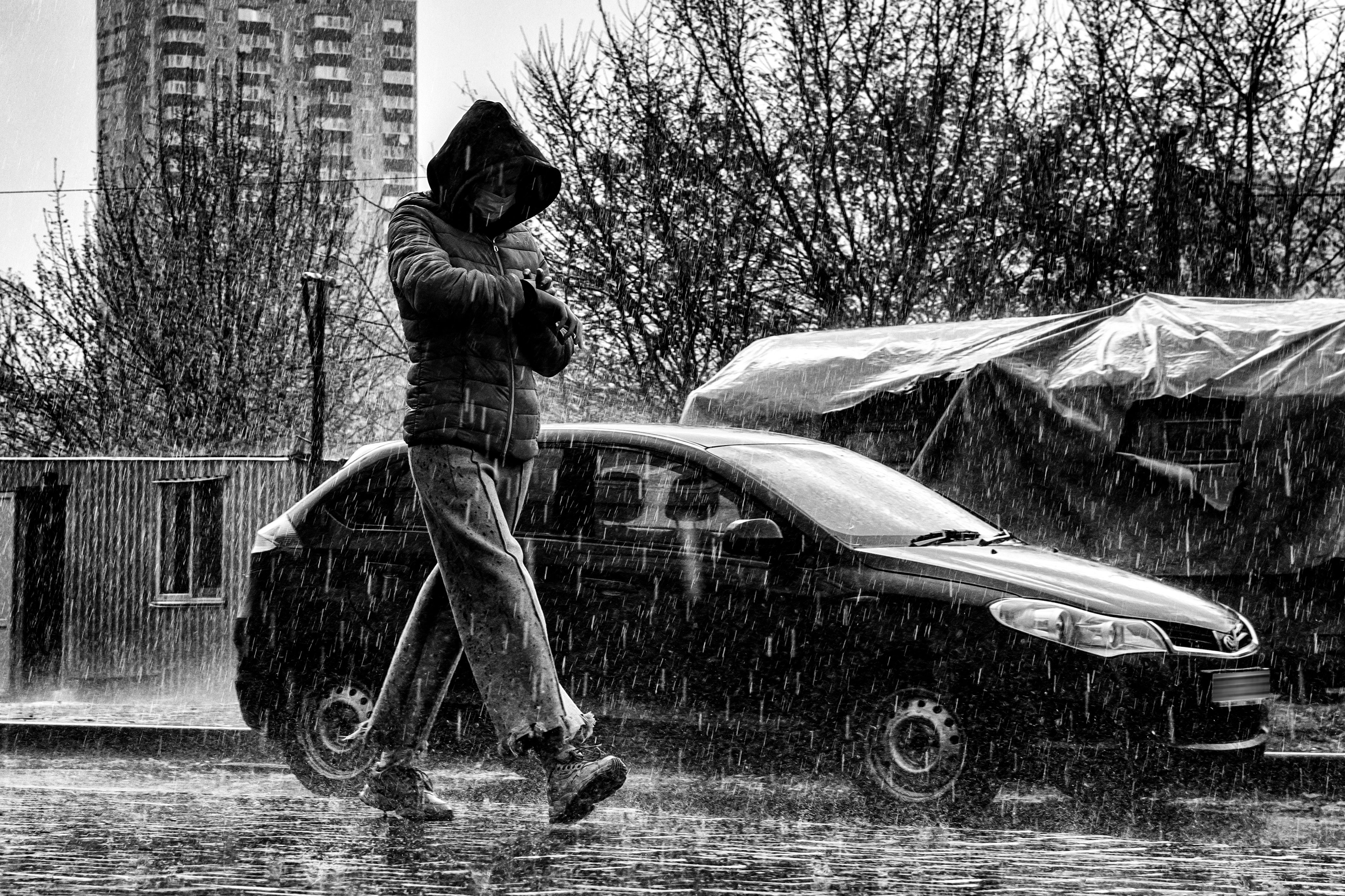 Woman during Cloudburst · Free Stock Photo