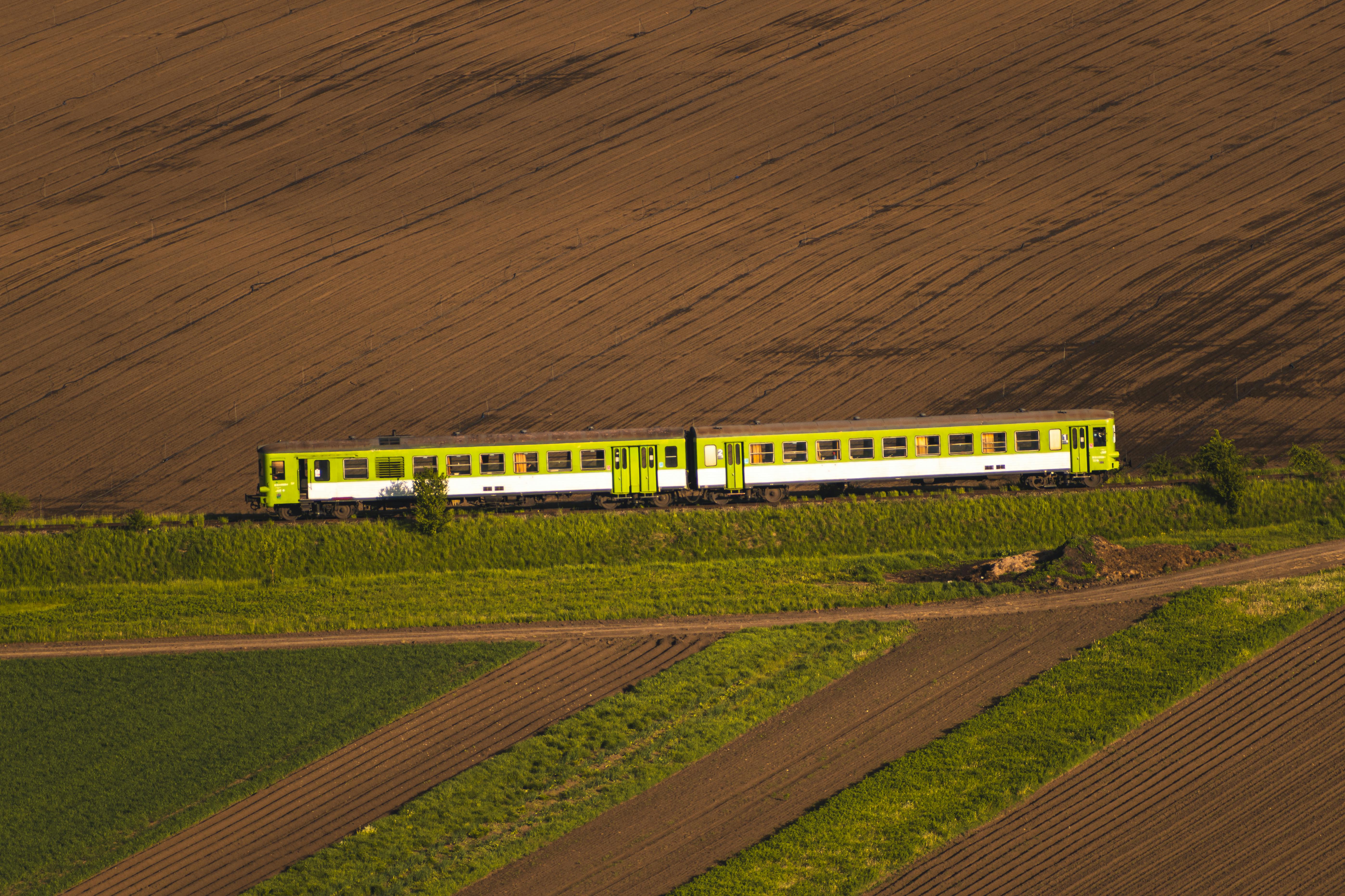 Train Travelling between Agricultural Fields · Free Stock Photo