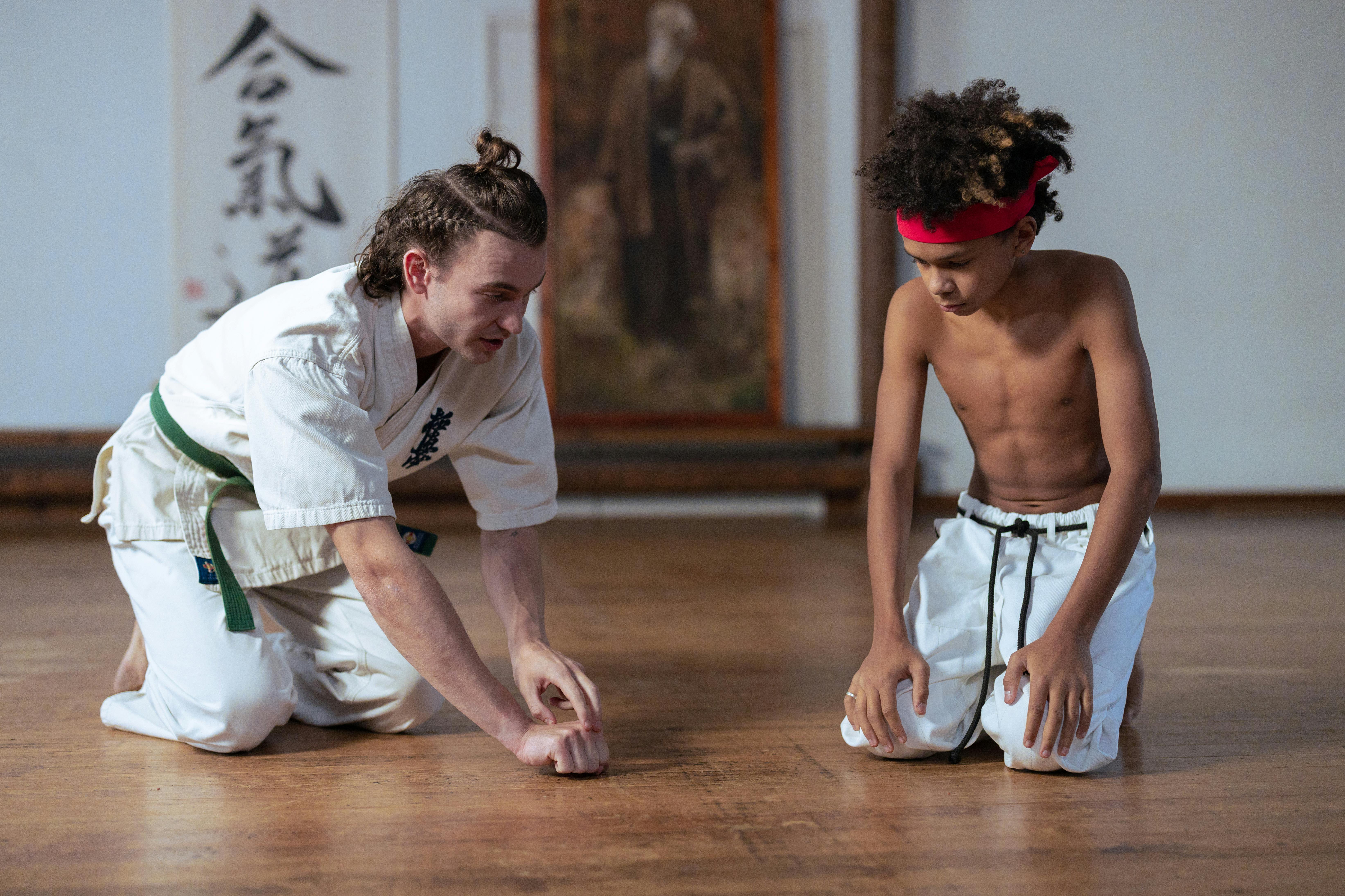 Man Training A Boy In Karate · Free Stock Photo