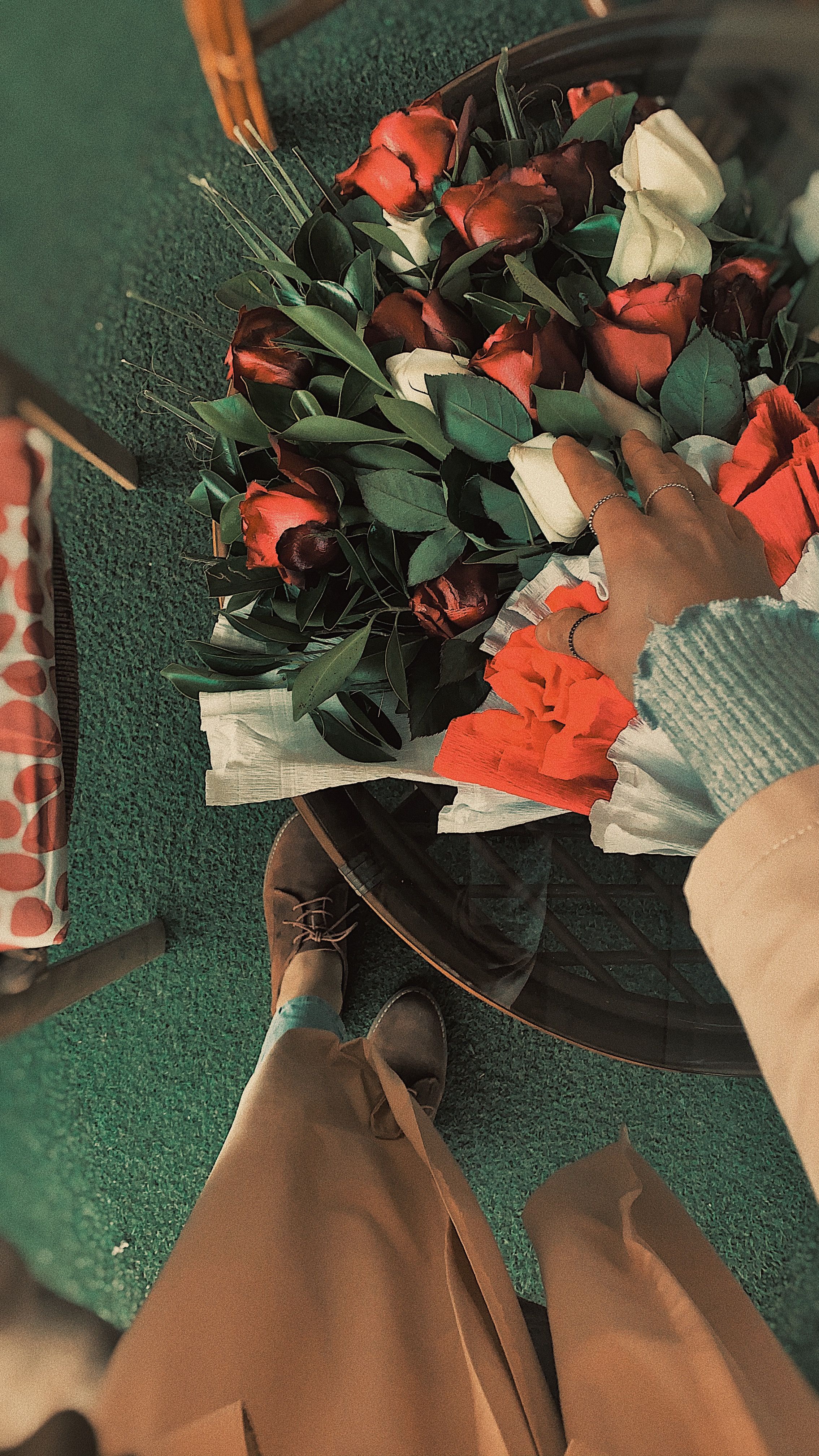Human Hand Holding Flowers Bouquet · Free Stock Photo