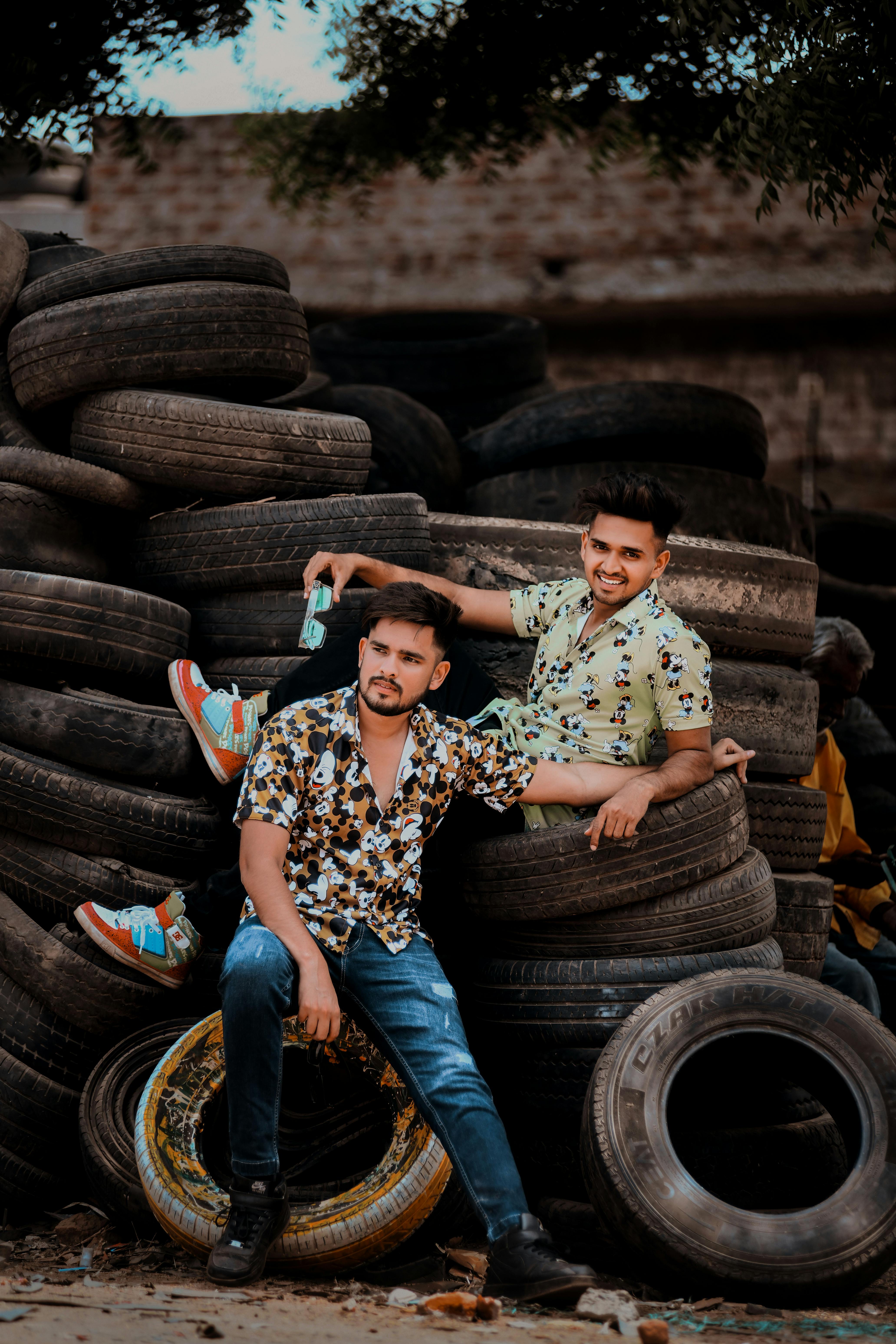 Four Male Models Posing on White Background · Free Stock Photo