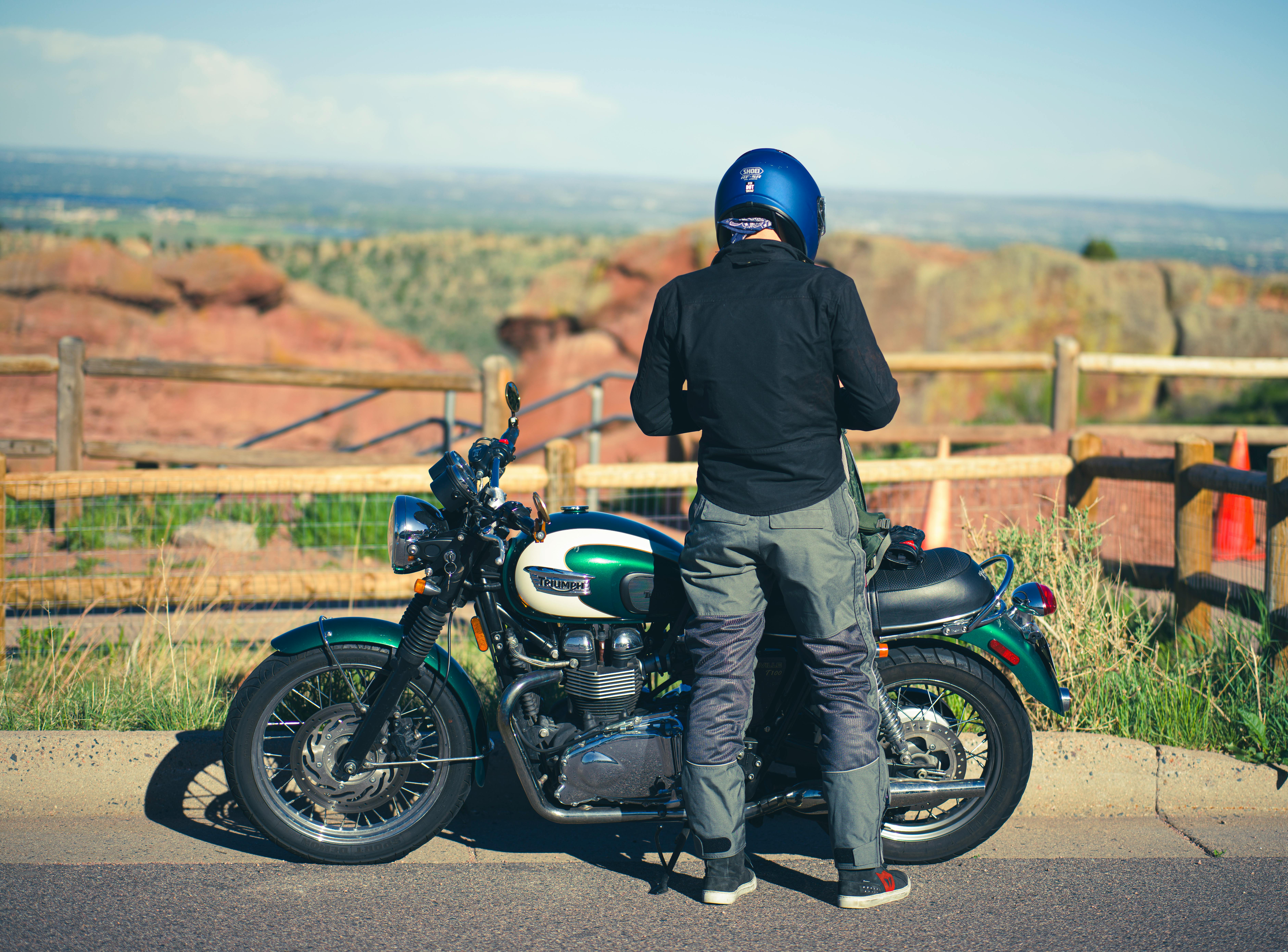 Person Riding Motorcycle during Golden Hour · Free Stock Photo