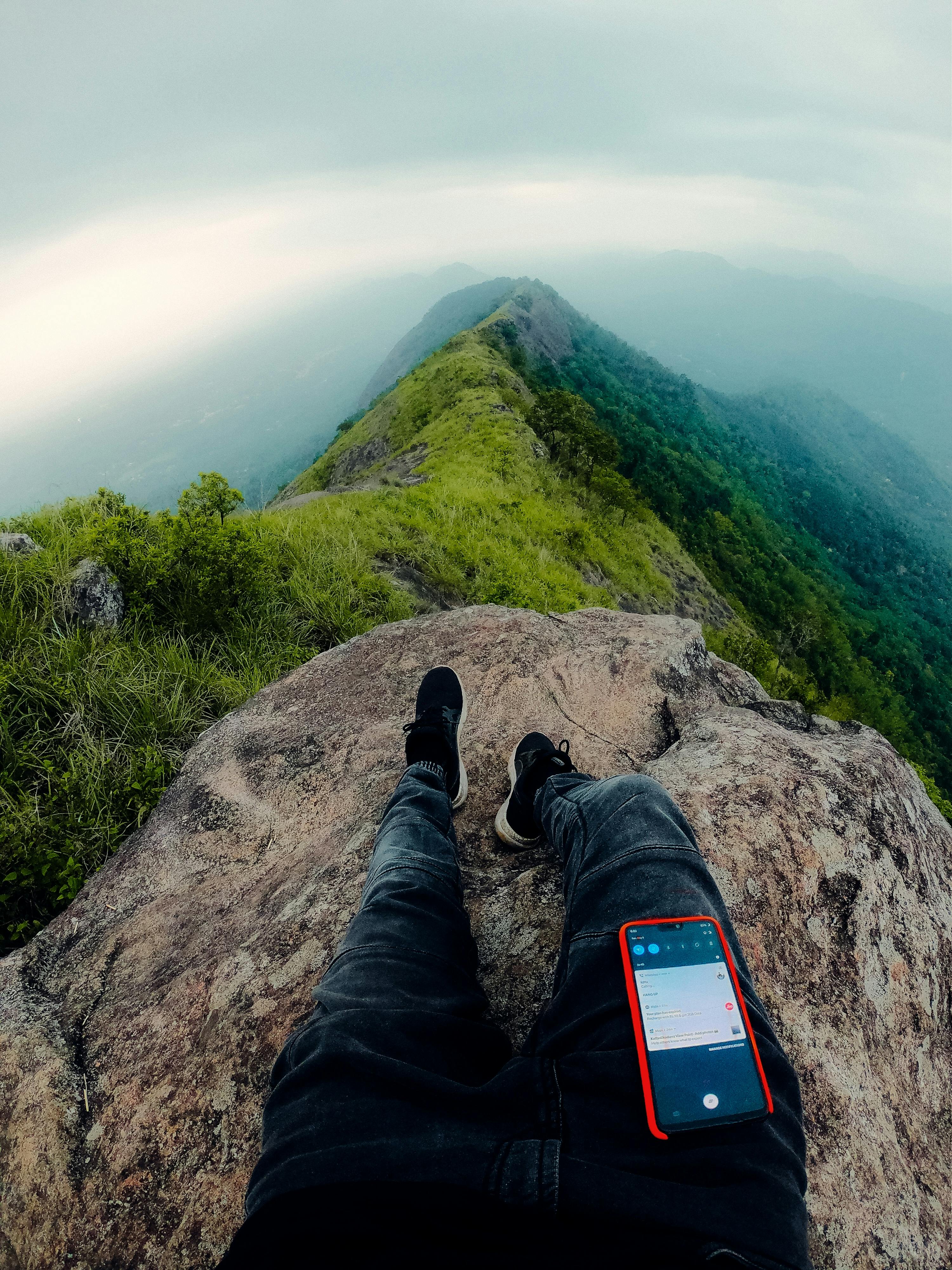 Point of View of a Person Sitting on Top of the Mountain Peak · Free ...