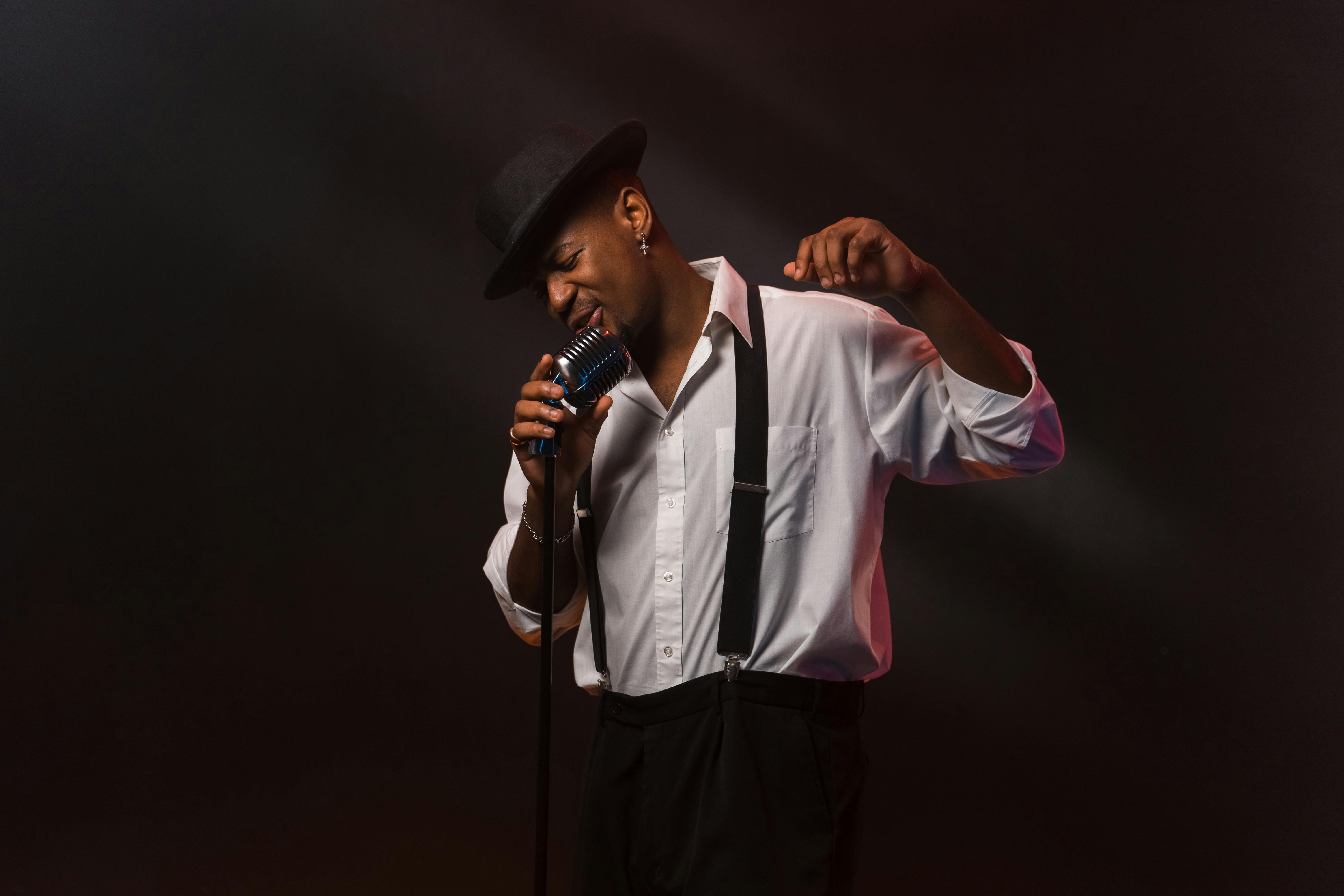 A Man Singing Emotionally · Free Stock Photo