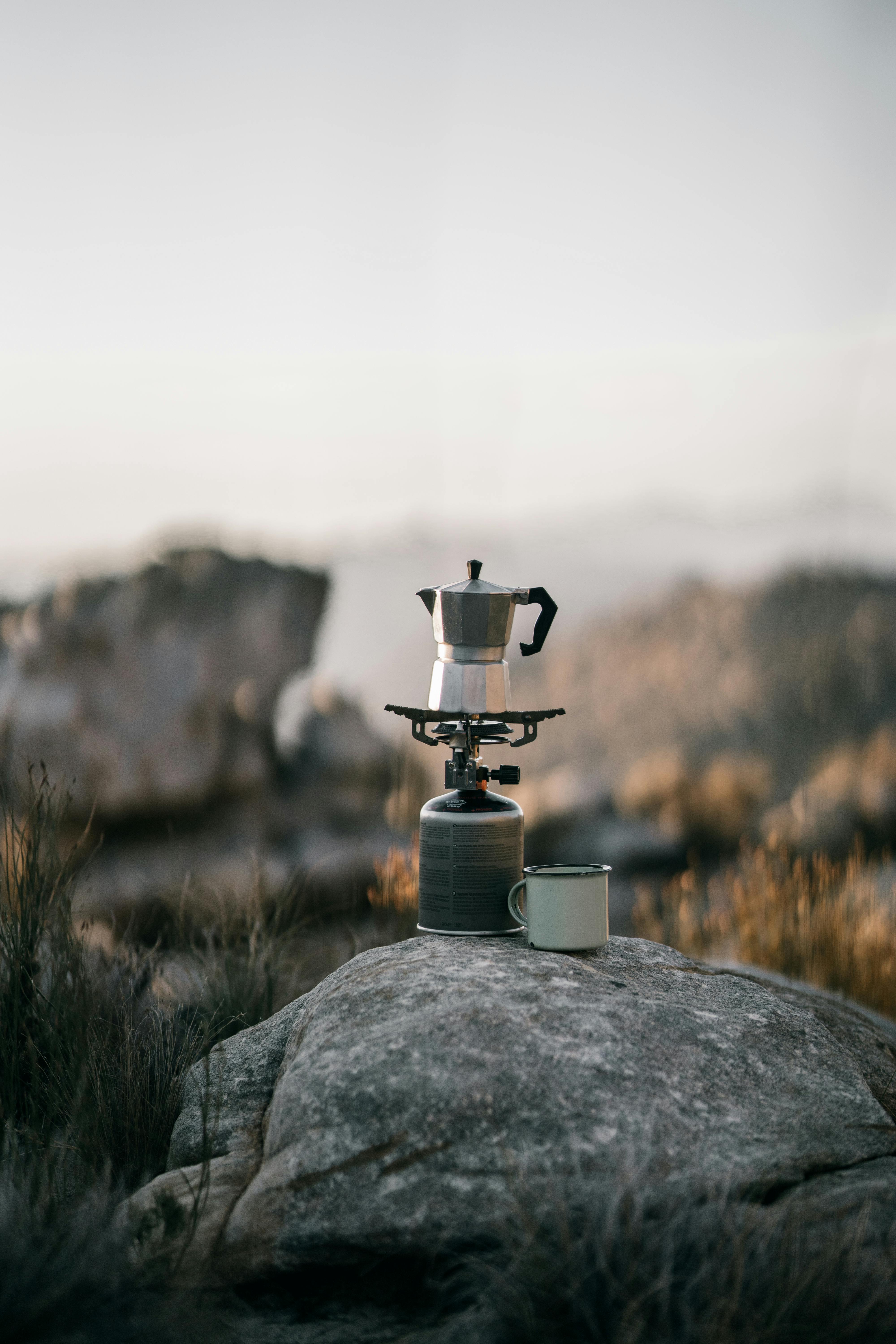 Brewing Coffee on Top of Rock · Free Stock Photo