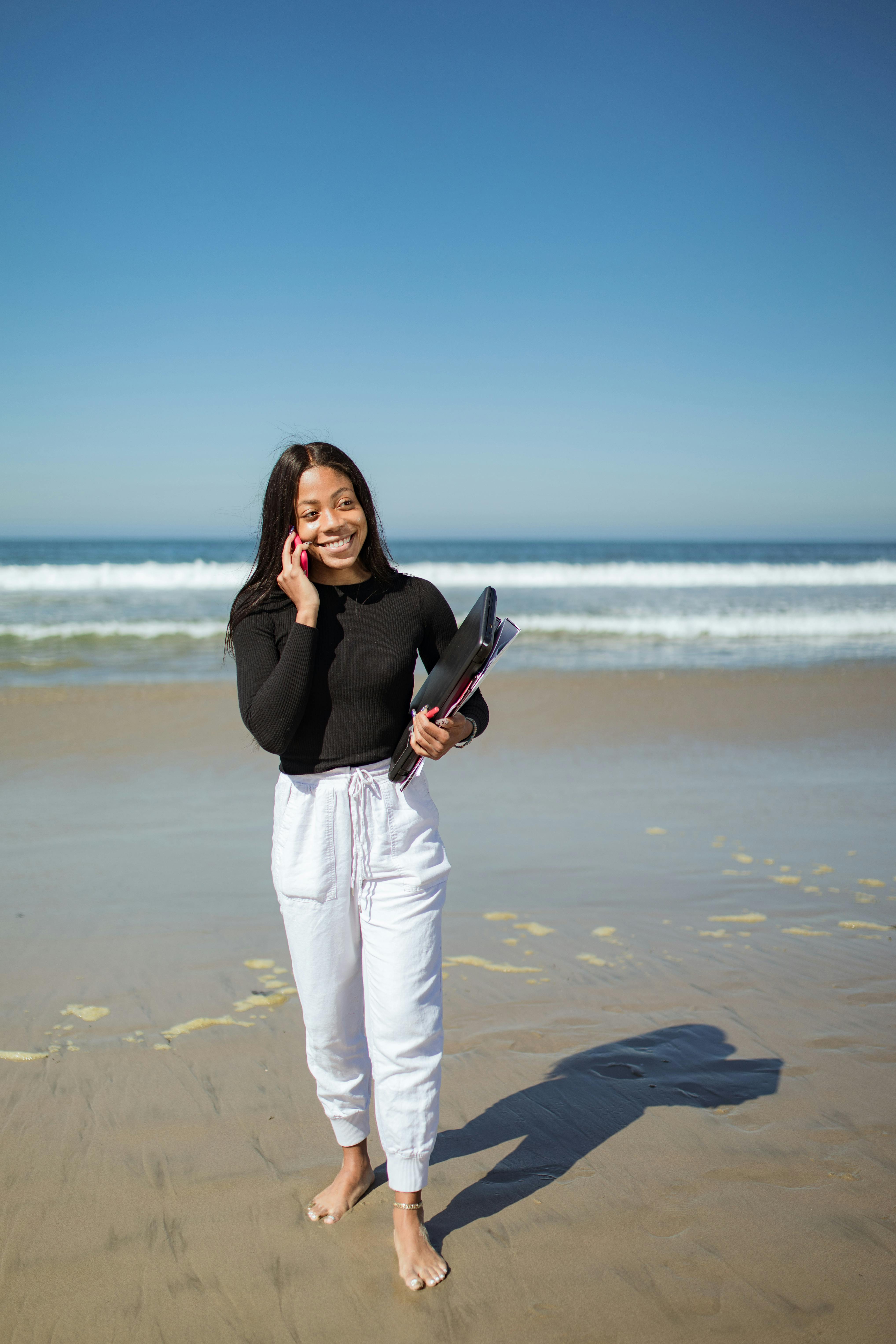 Elegantly Dressed Women Standing Outdoors and Talking · Free Stock Photo