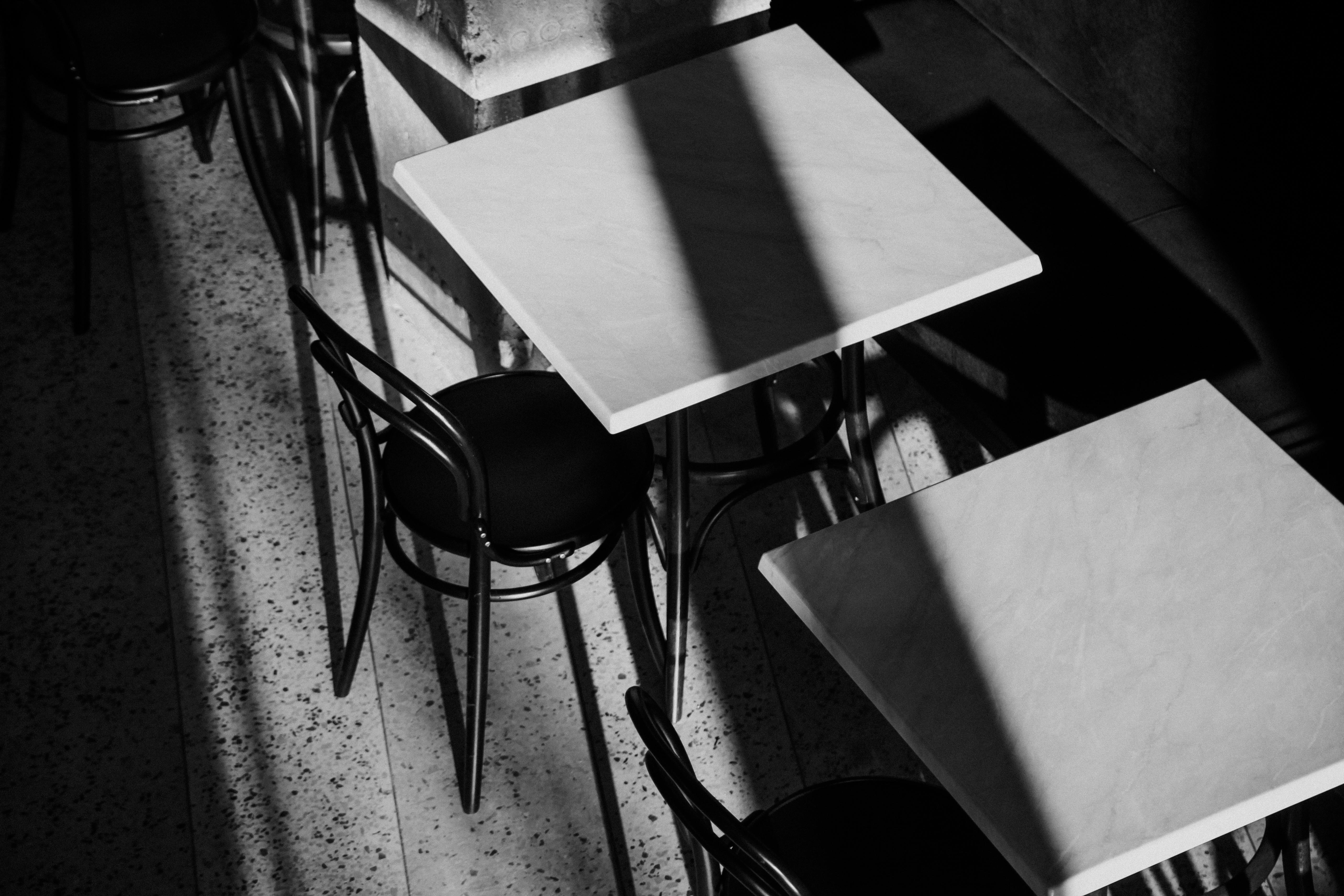 A Sunlight Falling on Chairs and Tables · Free Stock Photo