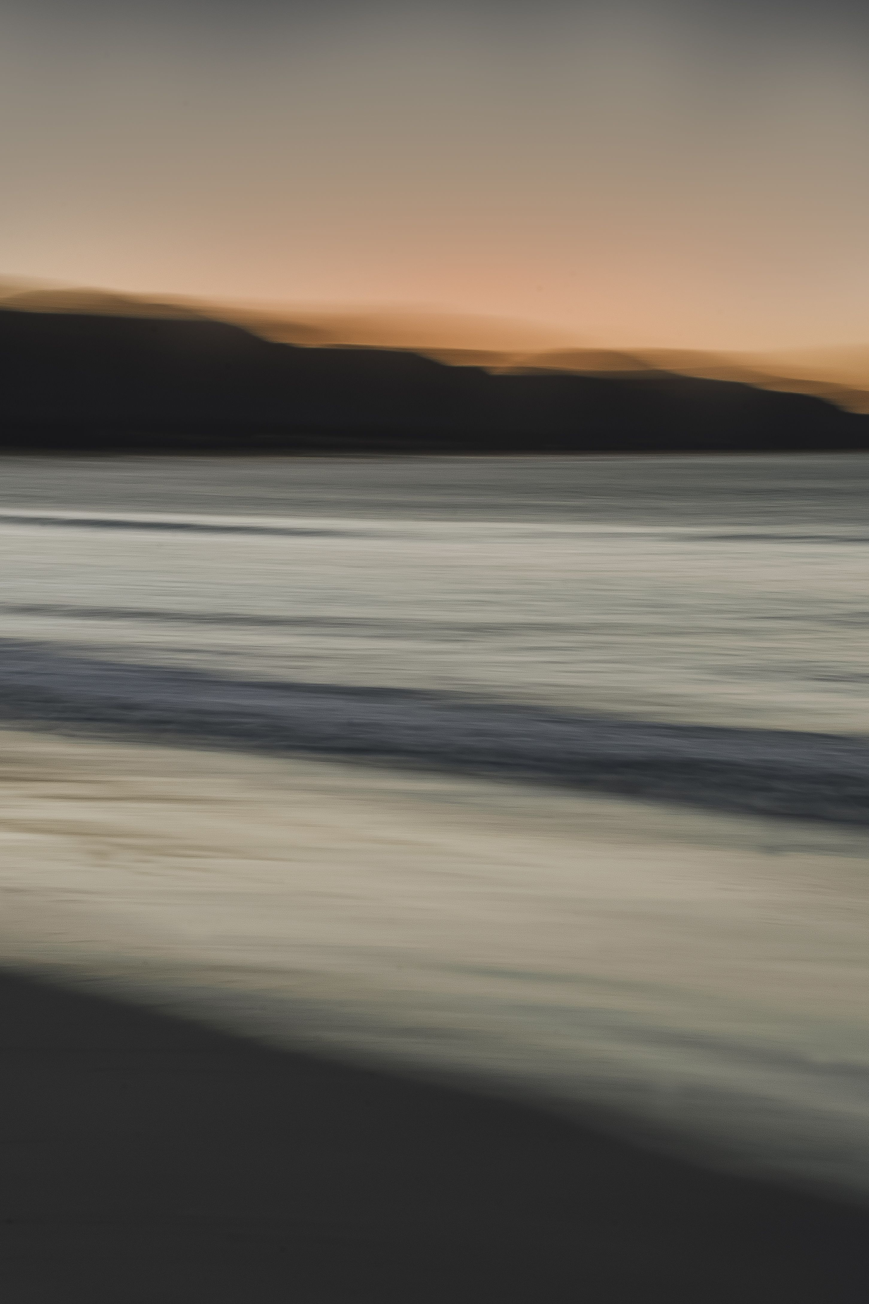 Person Standing on Sand · Free Stock Photo