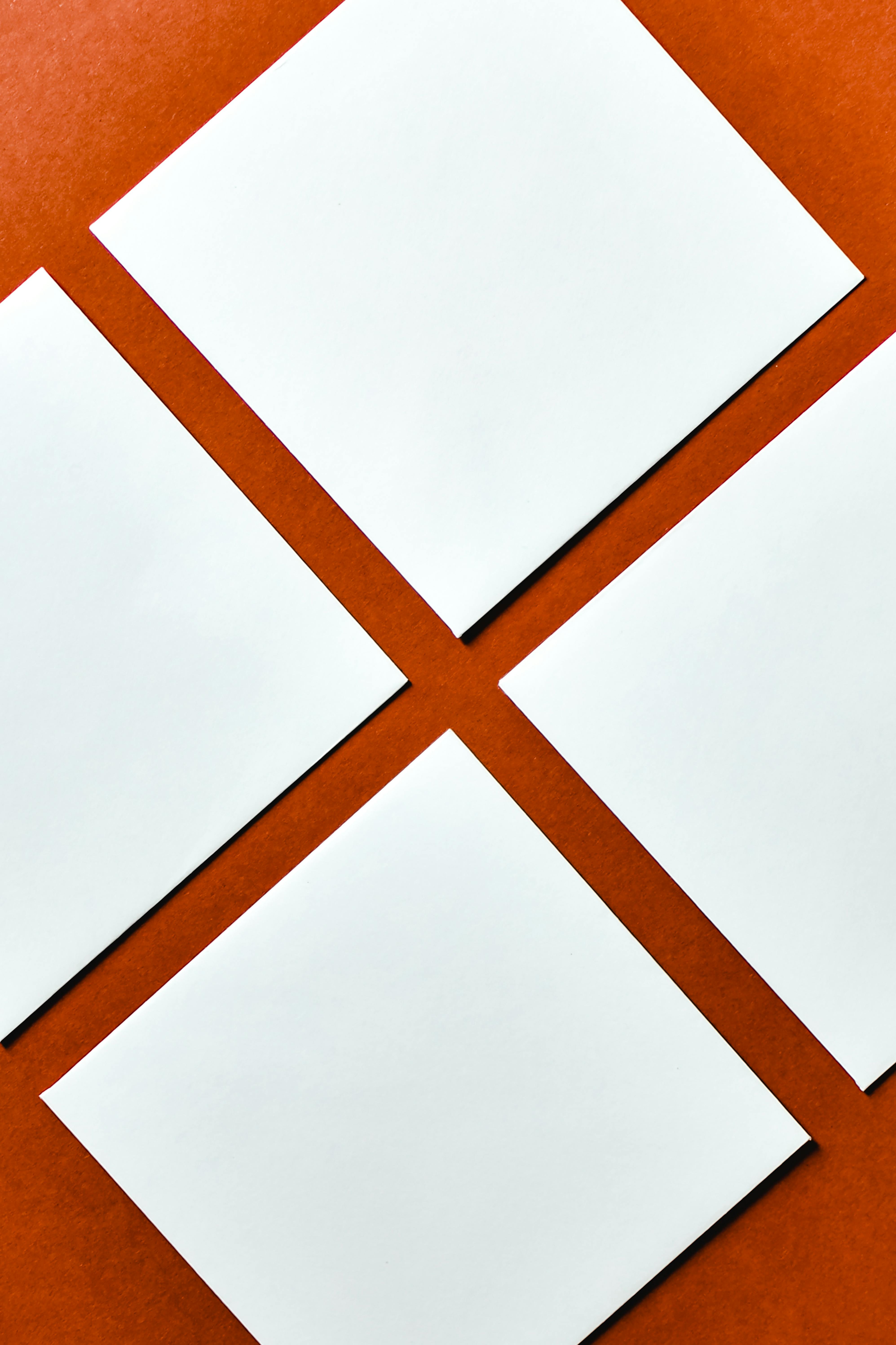 Square Shaped Blank Paper on Red Surface · Free Stock Photo