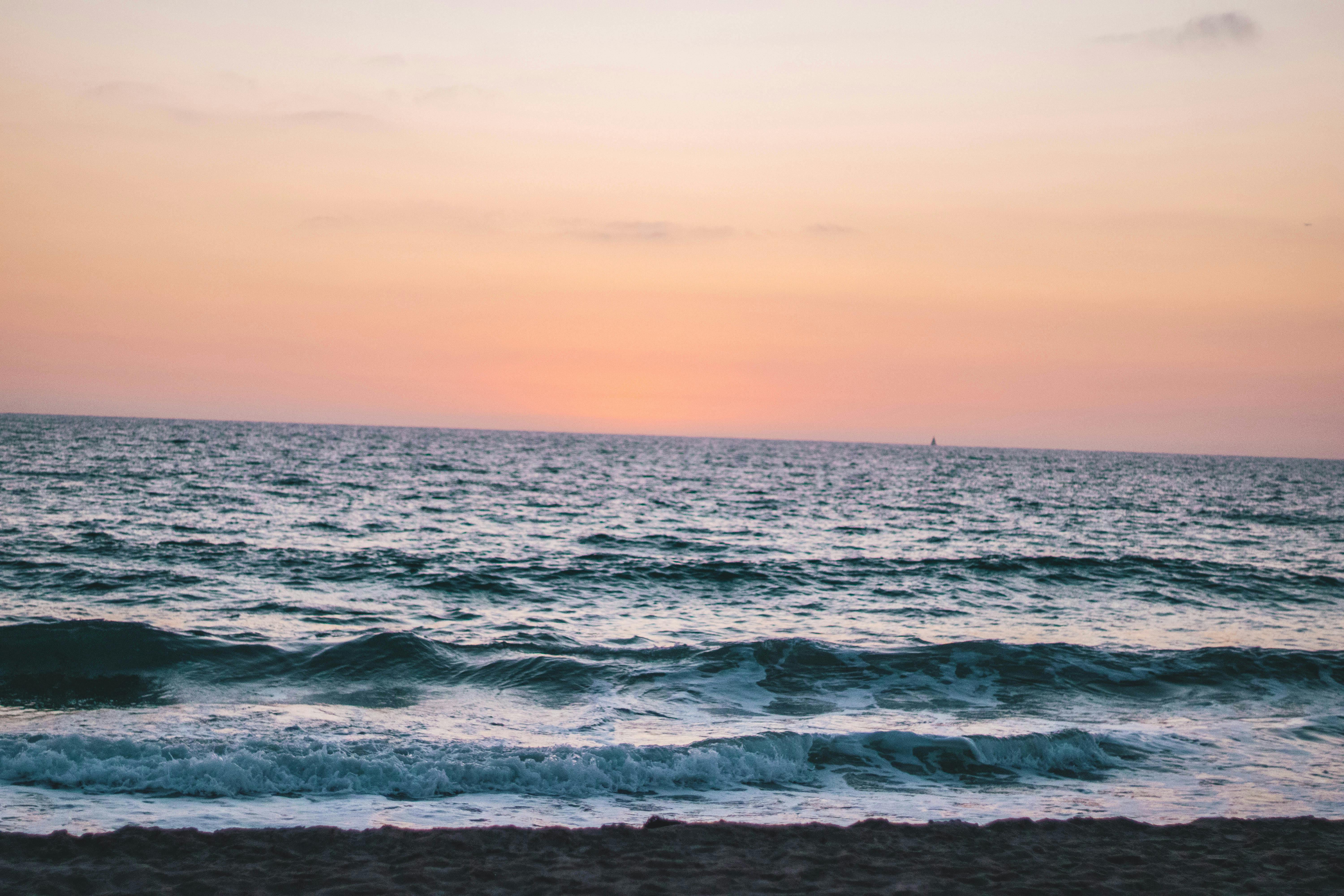 Sea during Sunset · Free Stock Photo