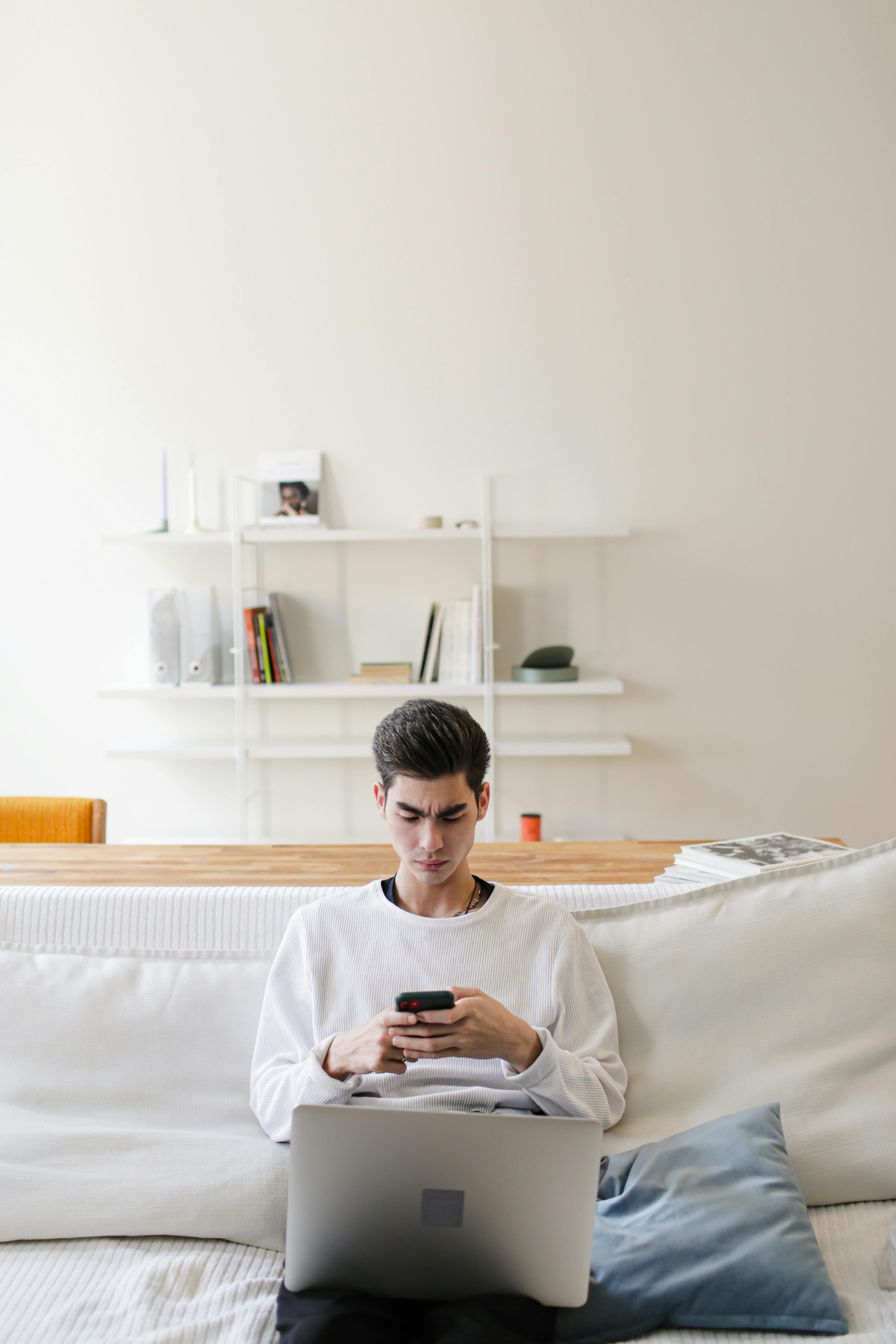 A Peron Using a Smartphone · Free Stock Photo