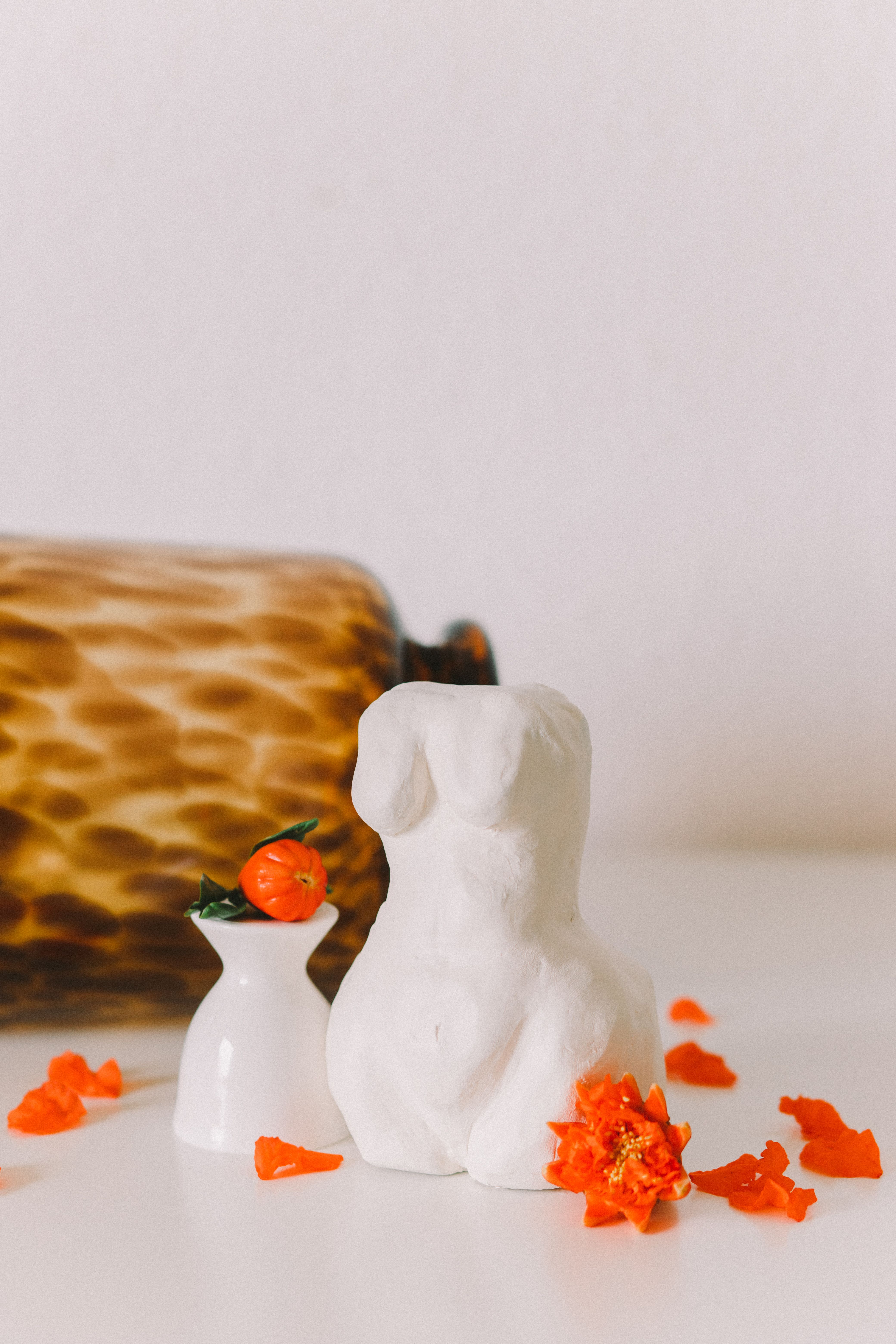 White Ceramic Figurine on White Table · Free Stock Photo