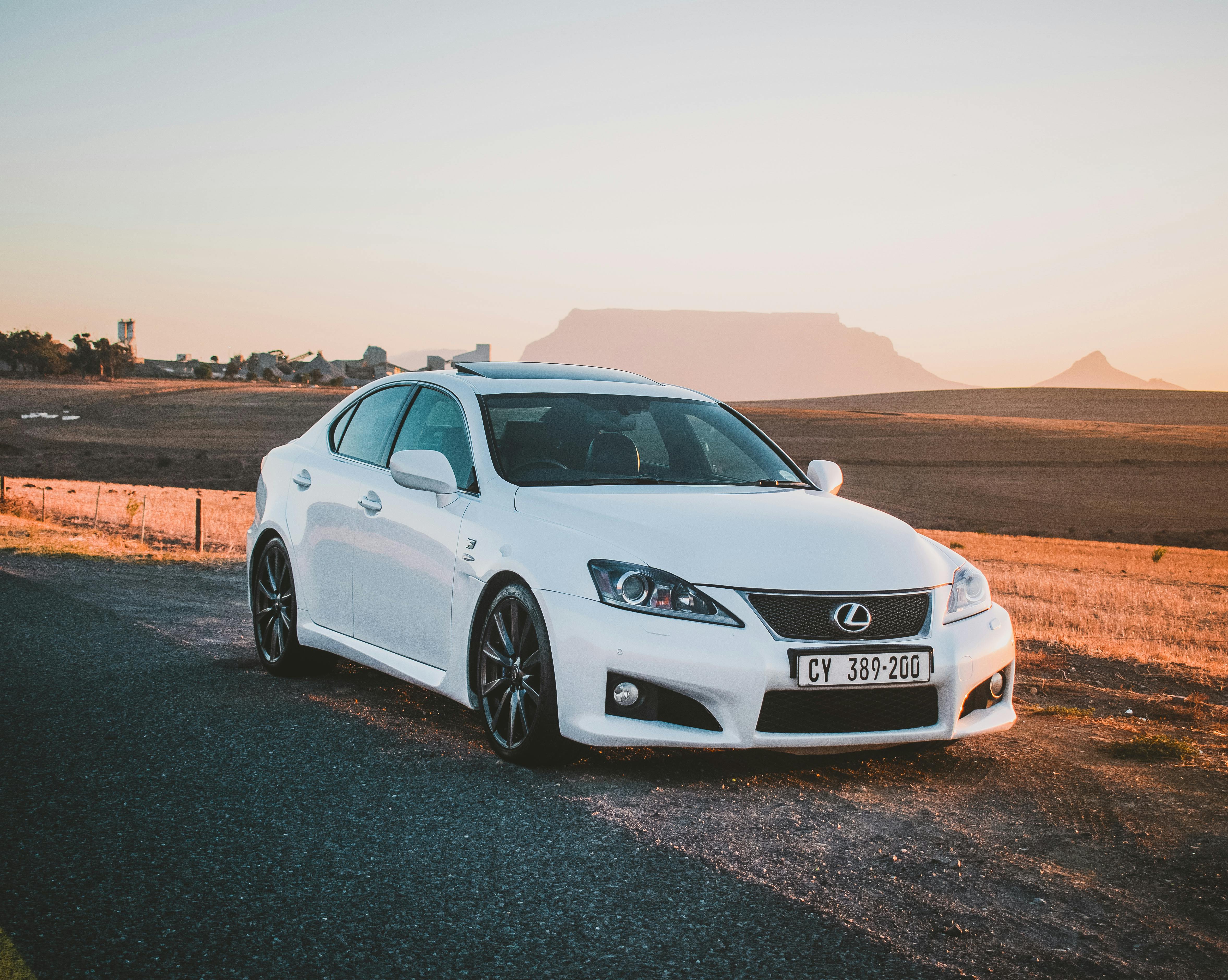 White Lexus Car on Road · Free Stock Photo