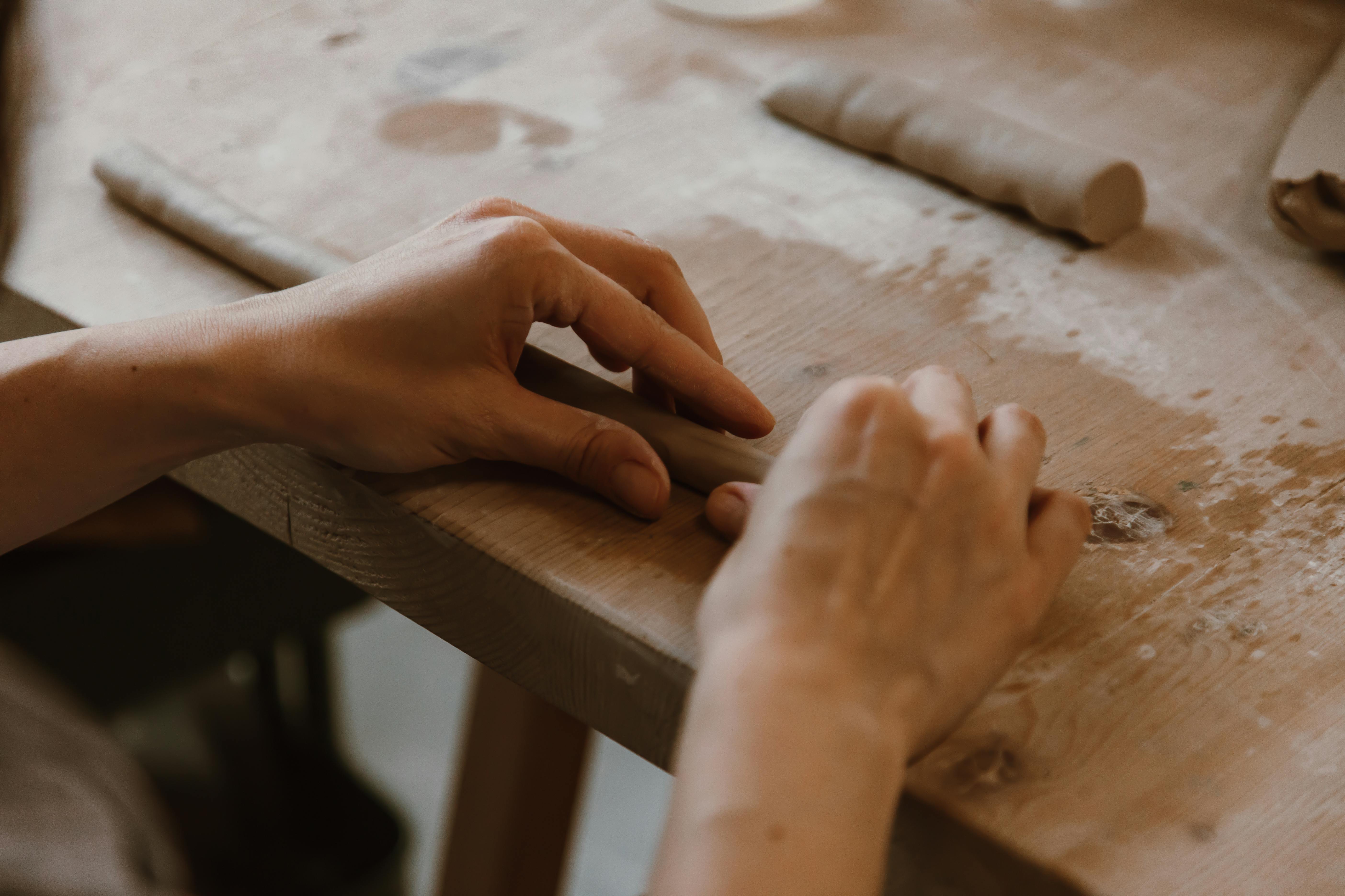 Hands Modelling in Clay · Free Stock Photo