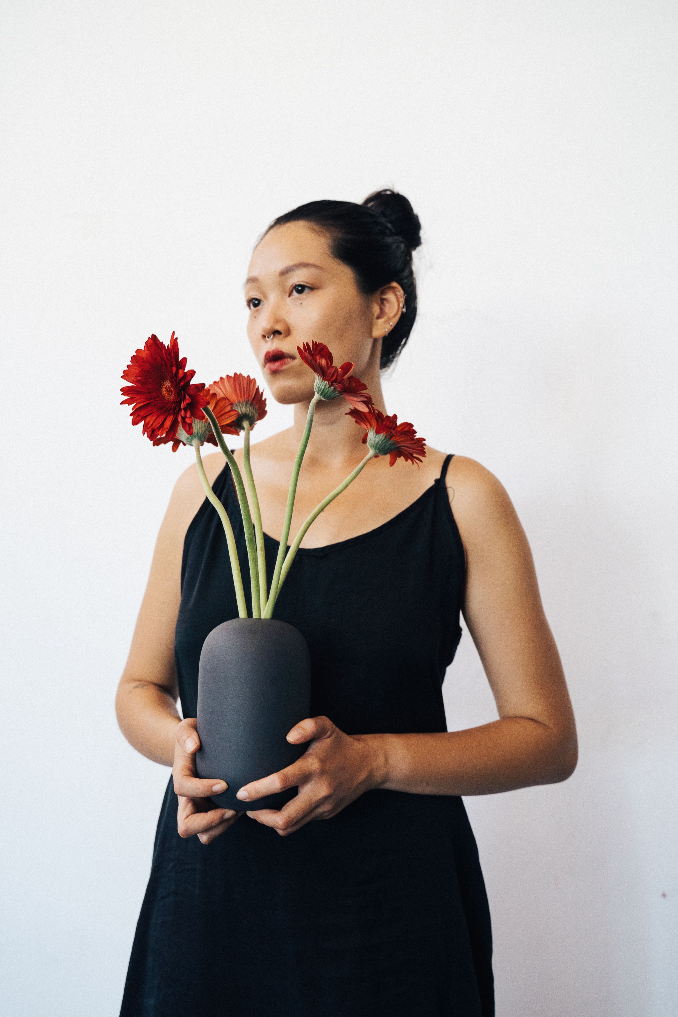 A Holding a Vase · Free Stock Photo