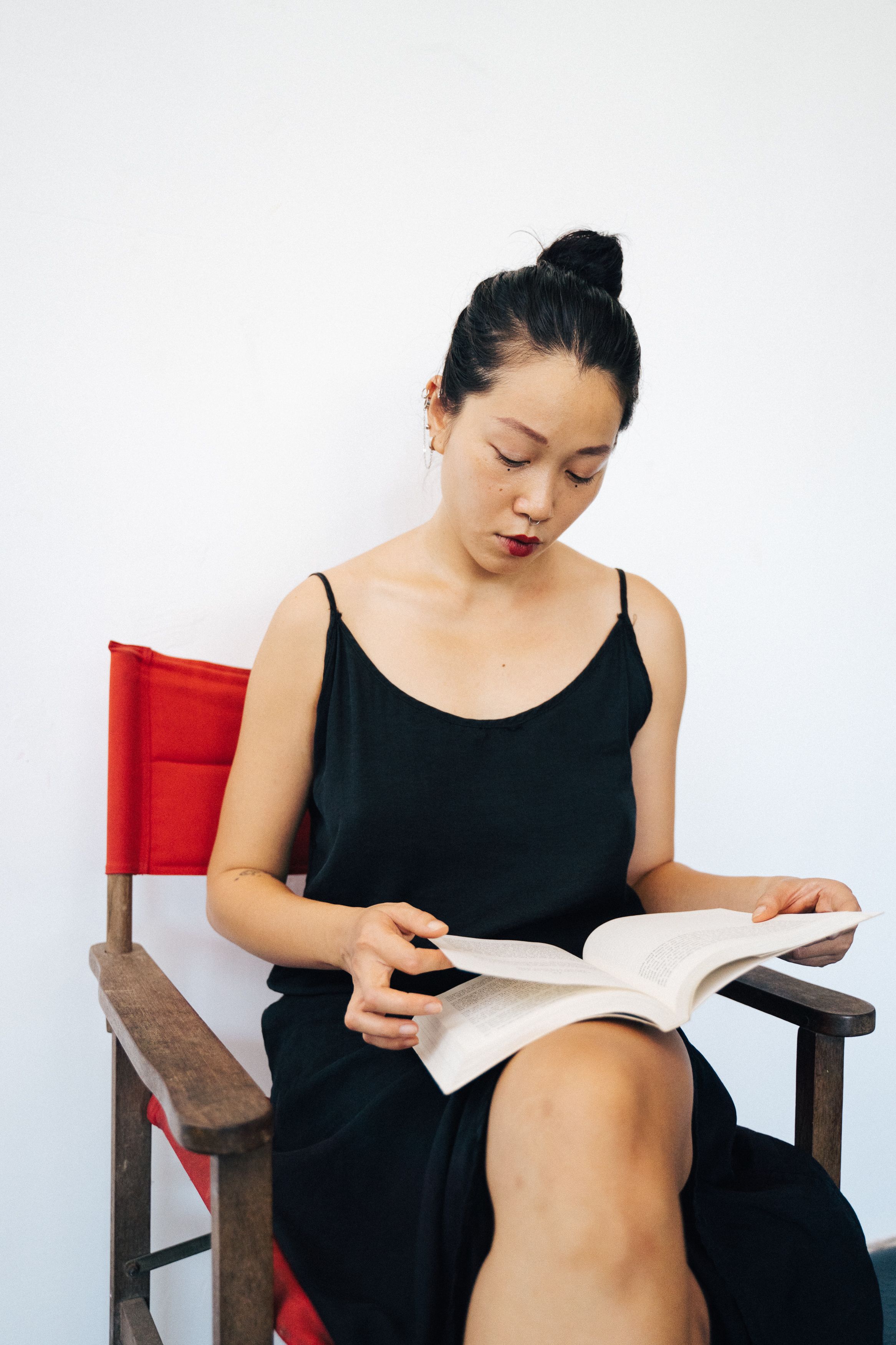 Woman Sitting with Book · Free Stock Photo