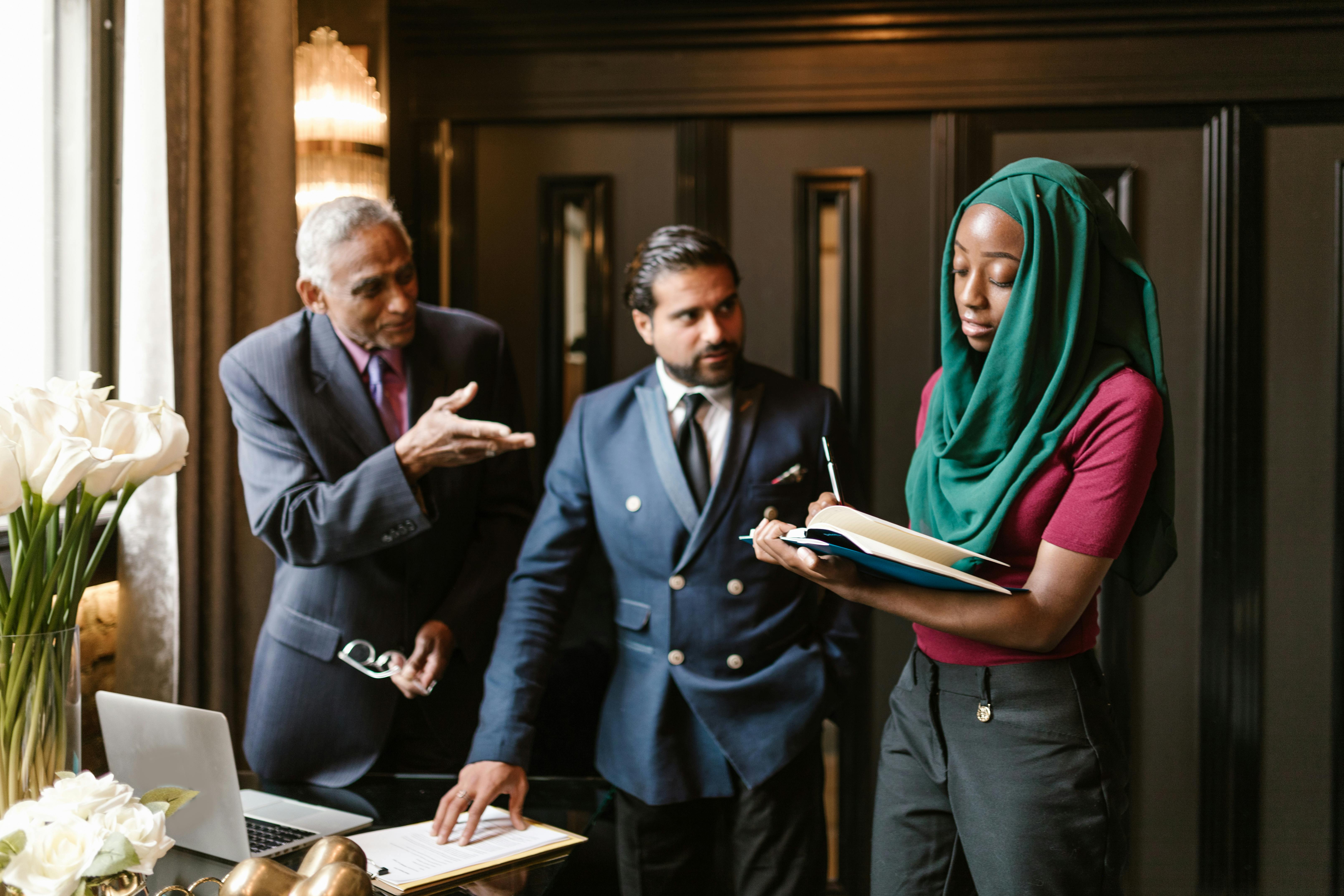 A Group of People Having Negotiations · Free Stock Photo