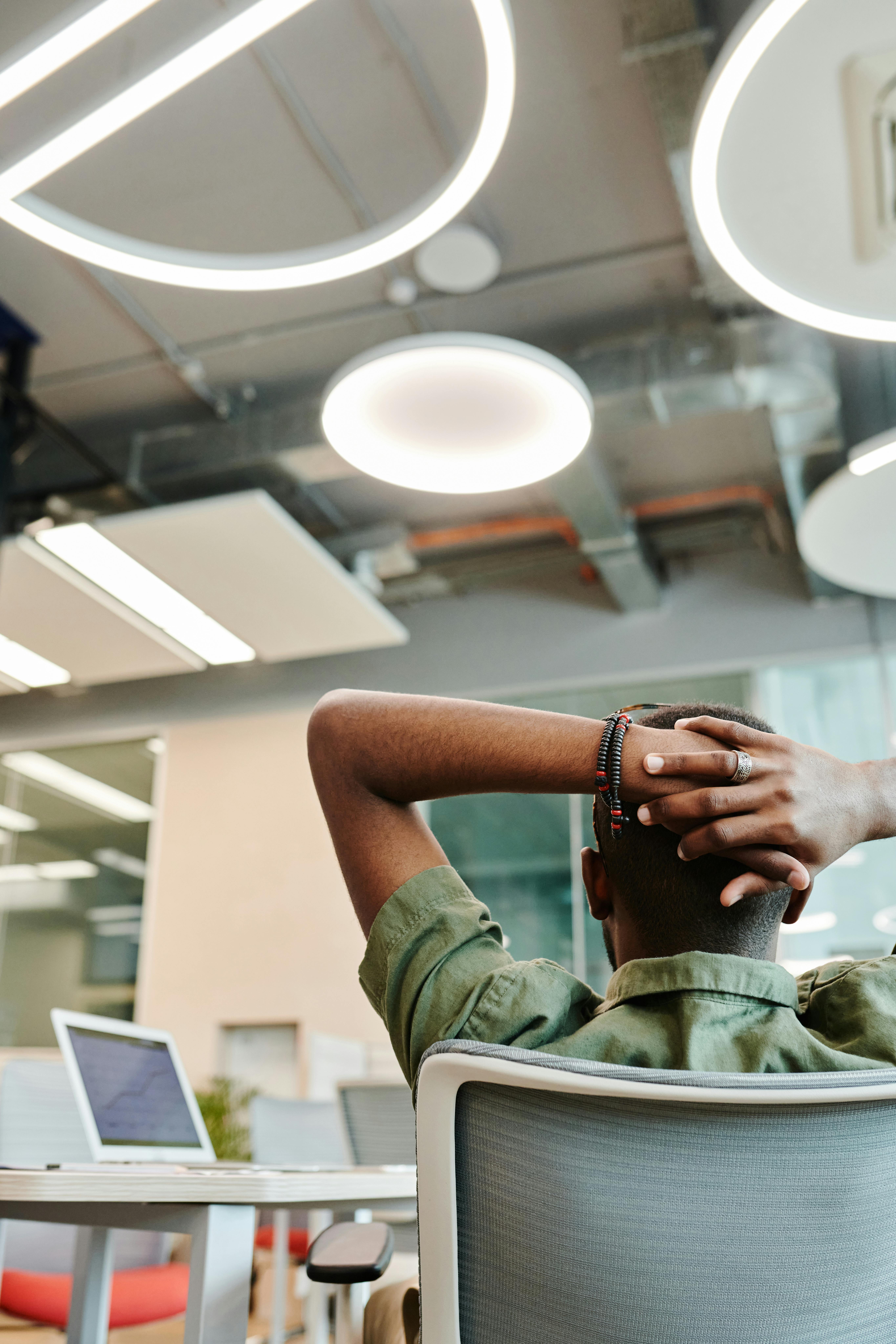 A Woman Sitting at the Table · Free Stock Photo