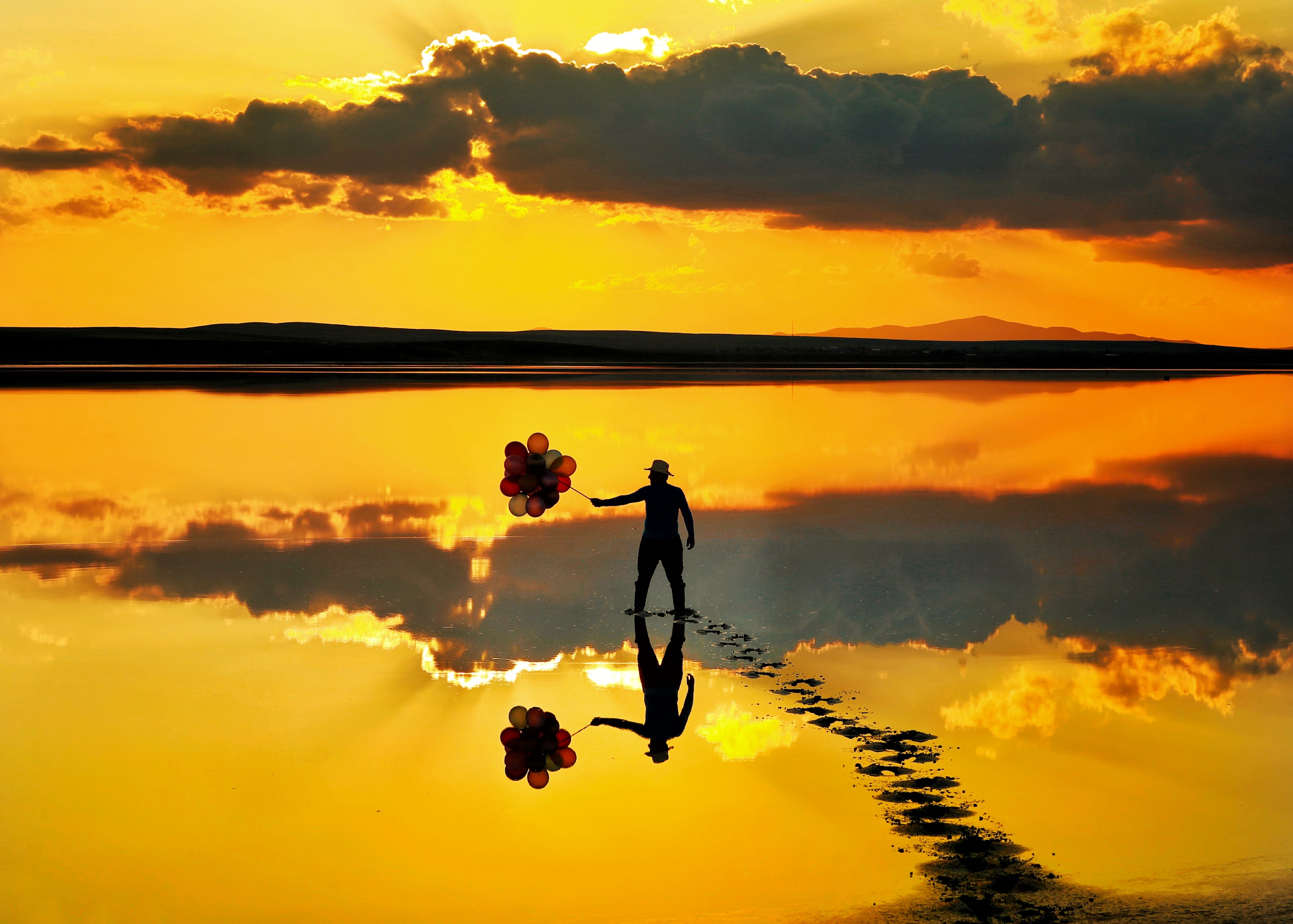 2 People on a Boat during Sunset · Free Stock Photo
