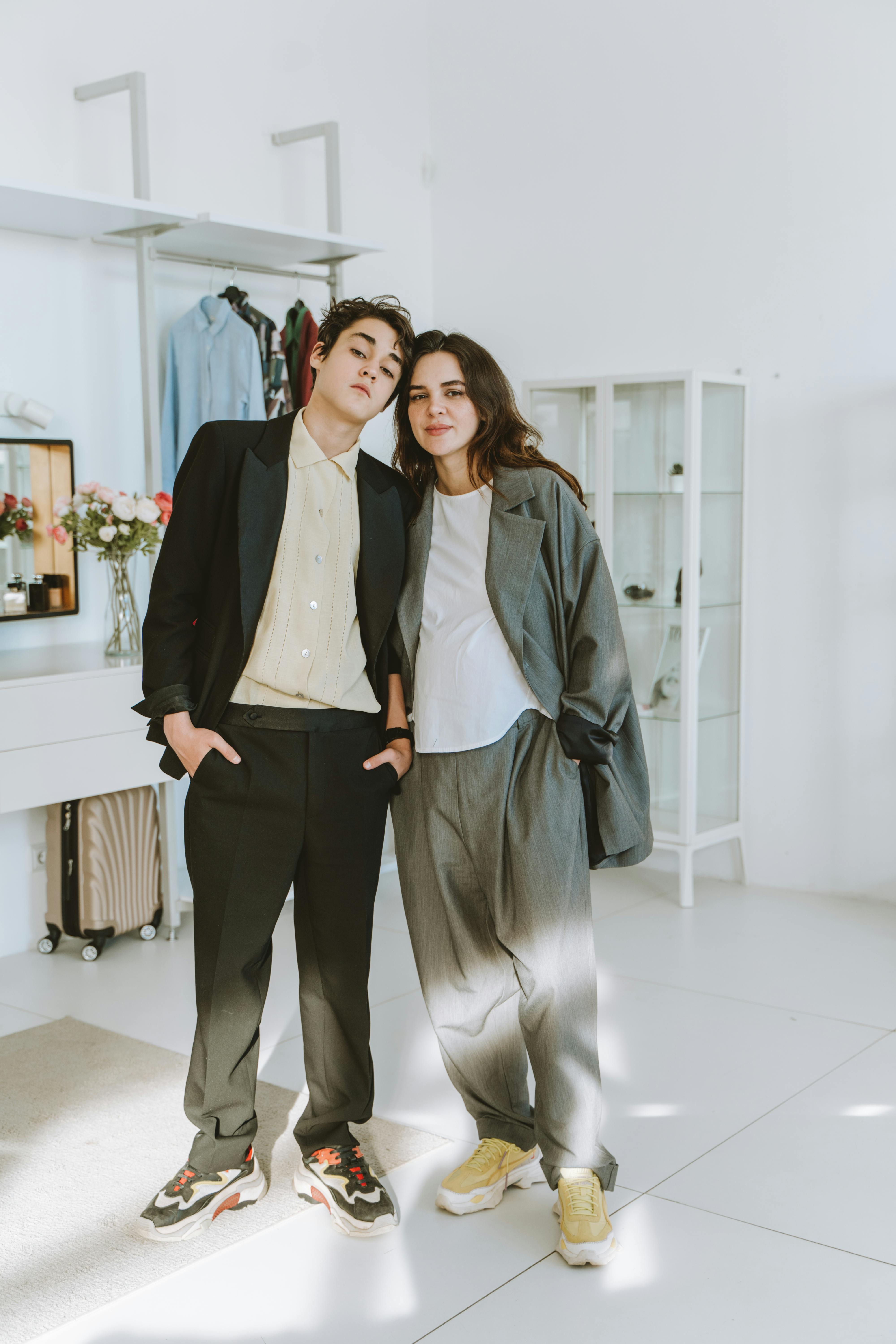 Young Couple With Racks Ofclothing Photos, Download The BEST Free Young ...