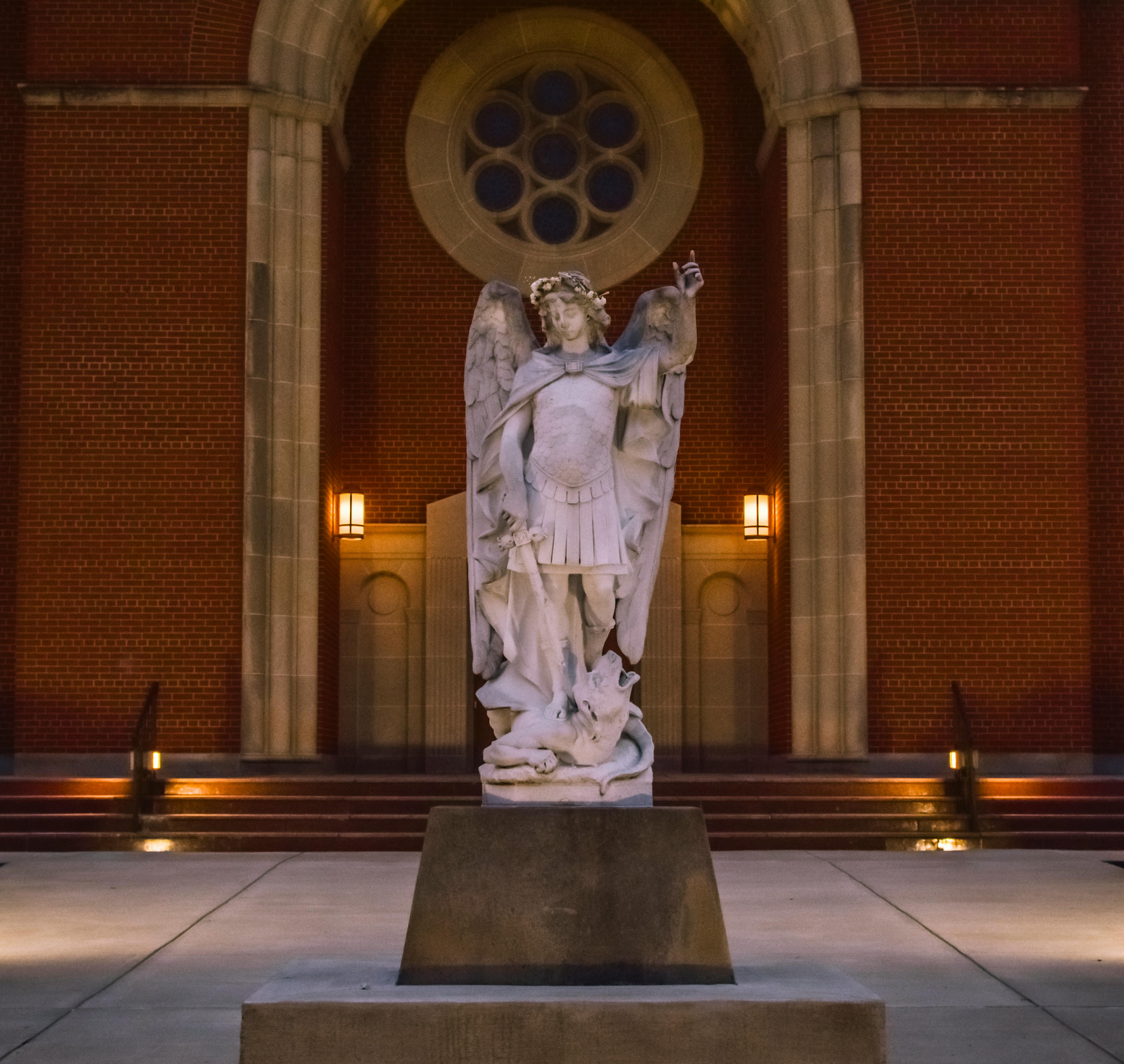 Angel Statue by Cathedral · Free Stock Photo