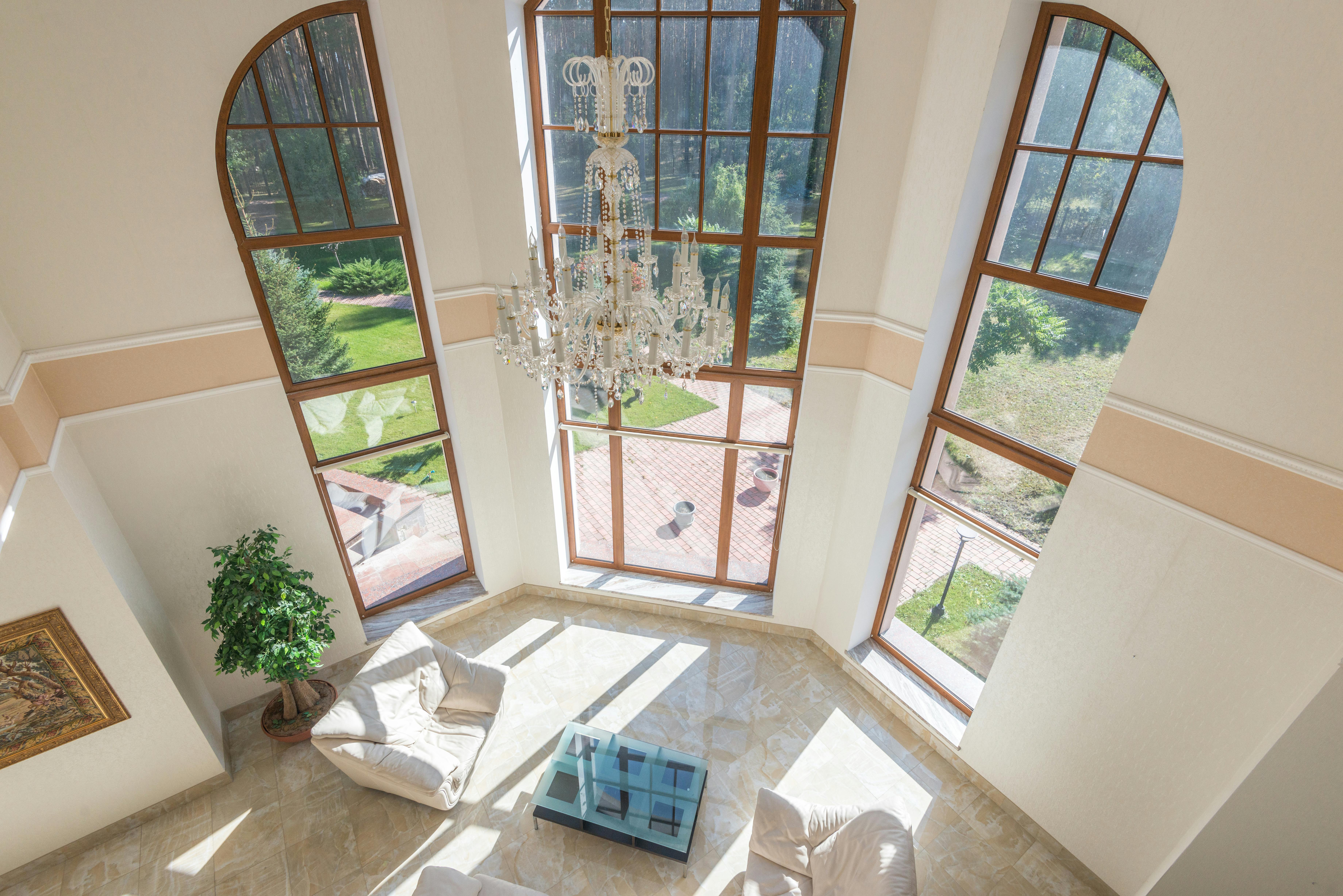 Modern, Elegant Living Room with Big Windows · Free Stock Photo