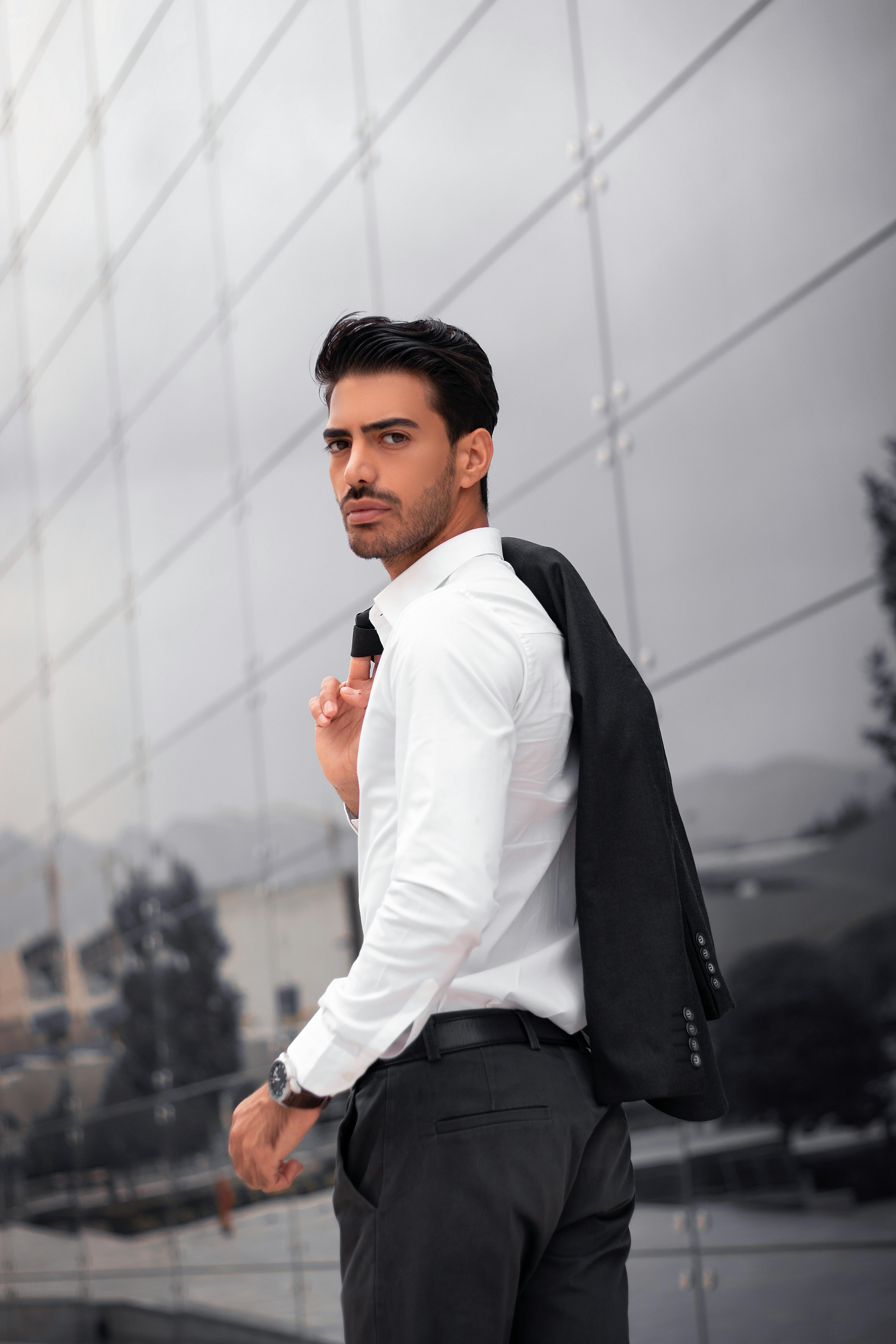 A Rich Man Wearing a White Formal Coat · Free Stock Photo