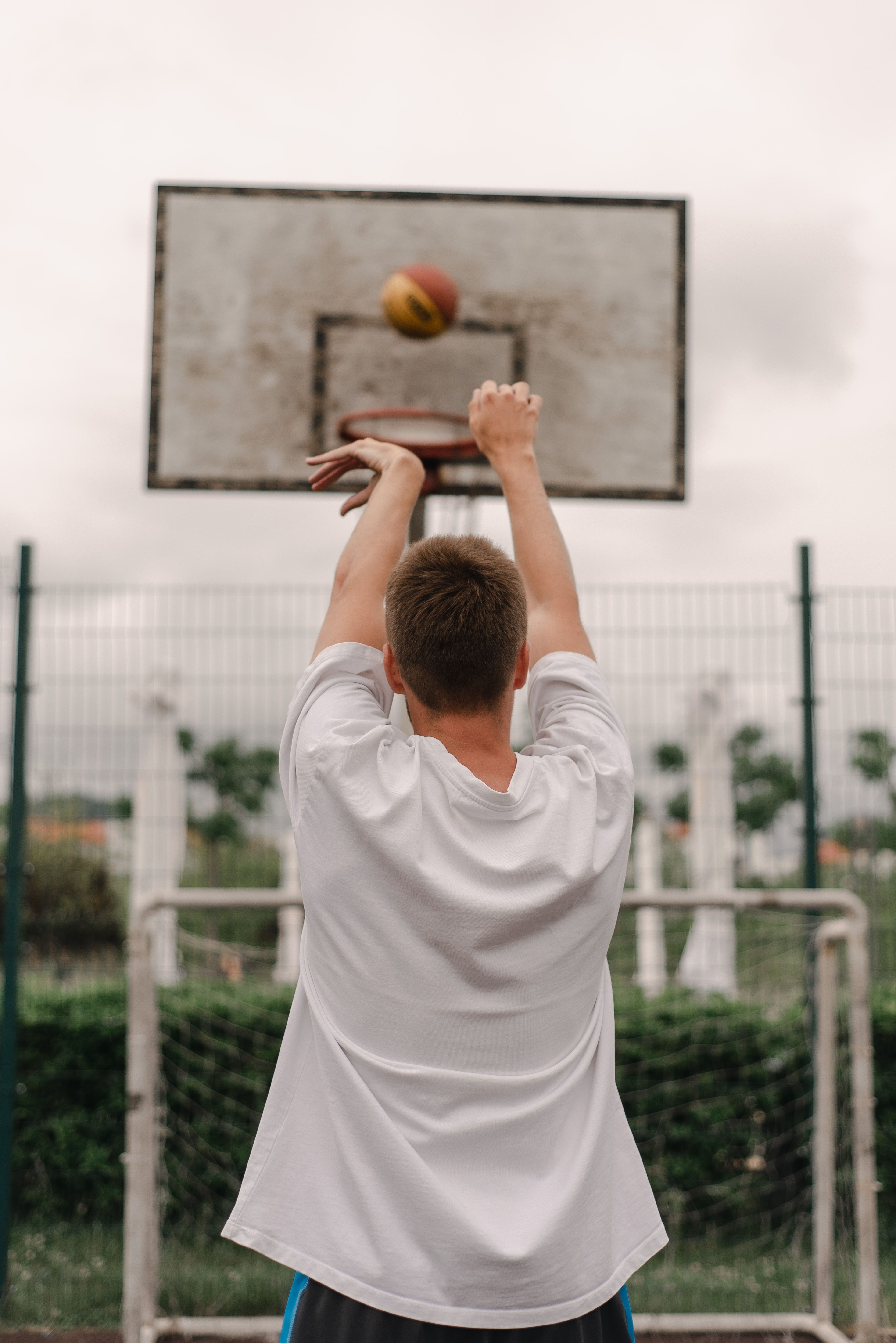 A man Shooting Form in Basketball · Free Stock Photo