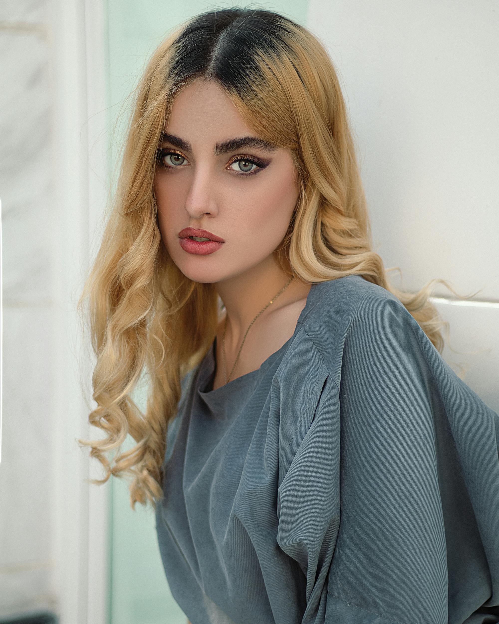 A Female Model Looking at Camera and Wearing a White Shirt · Free Stock ...