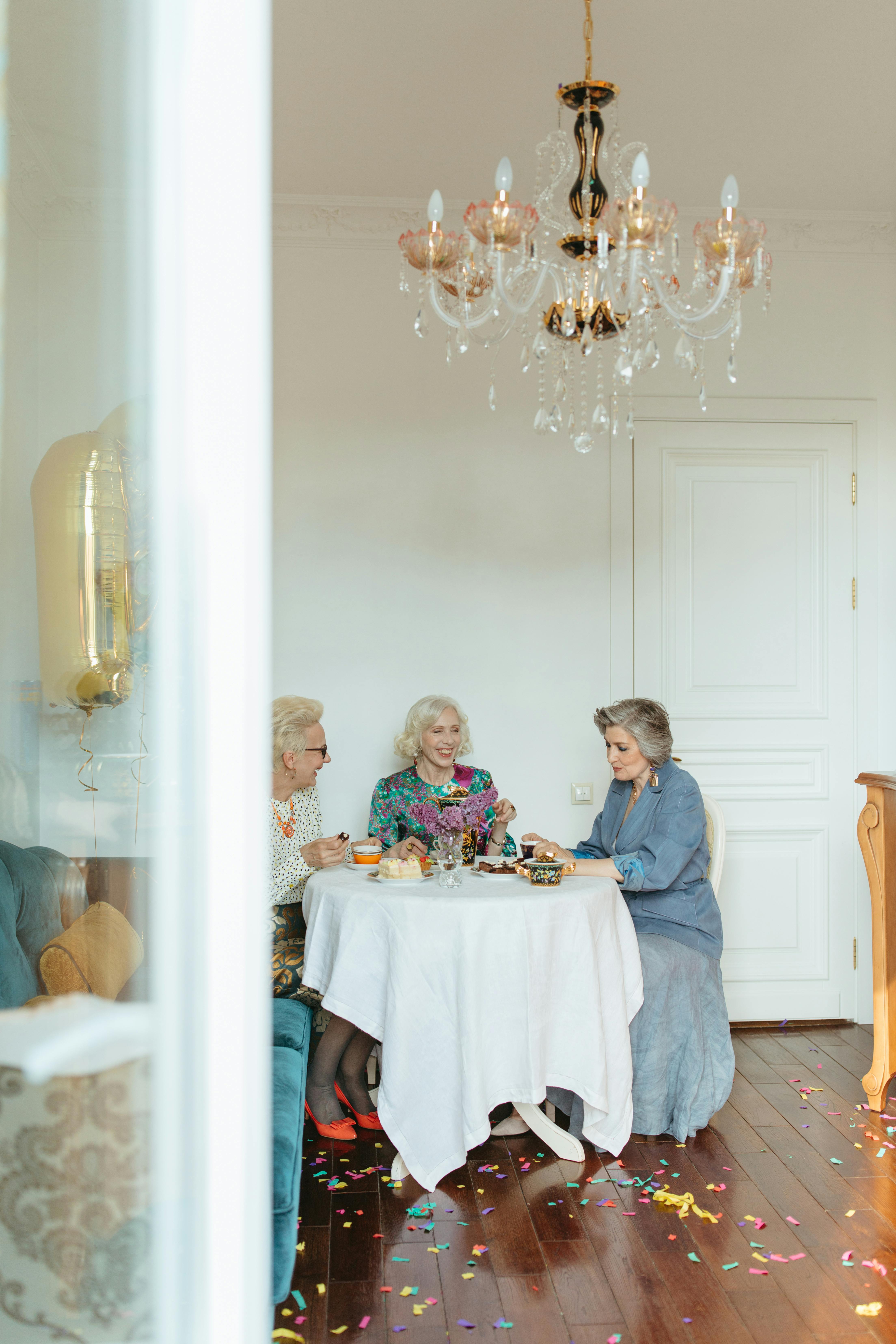 Elderly Women Sitting Together by Table · Free Stock Photo