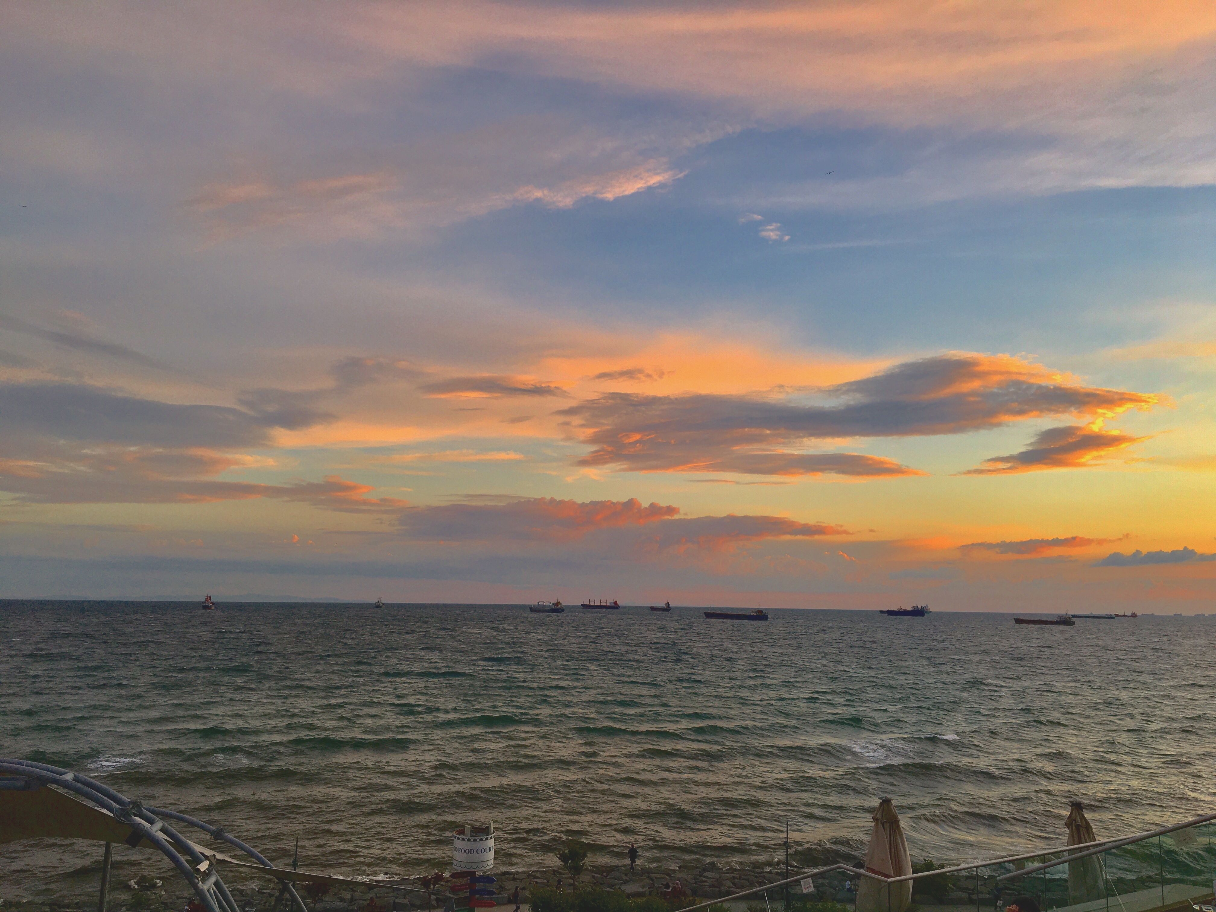 Body of Water Under Sunset · Free Stock Photo