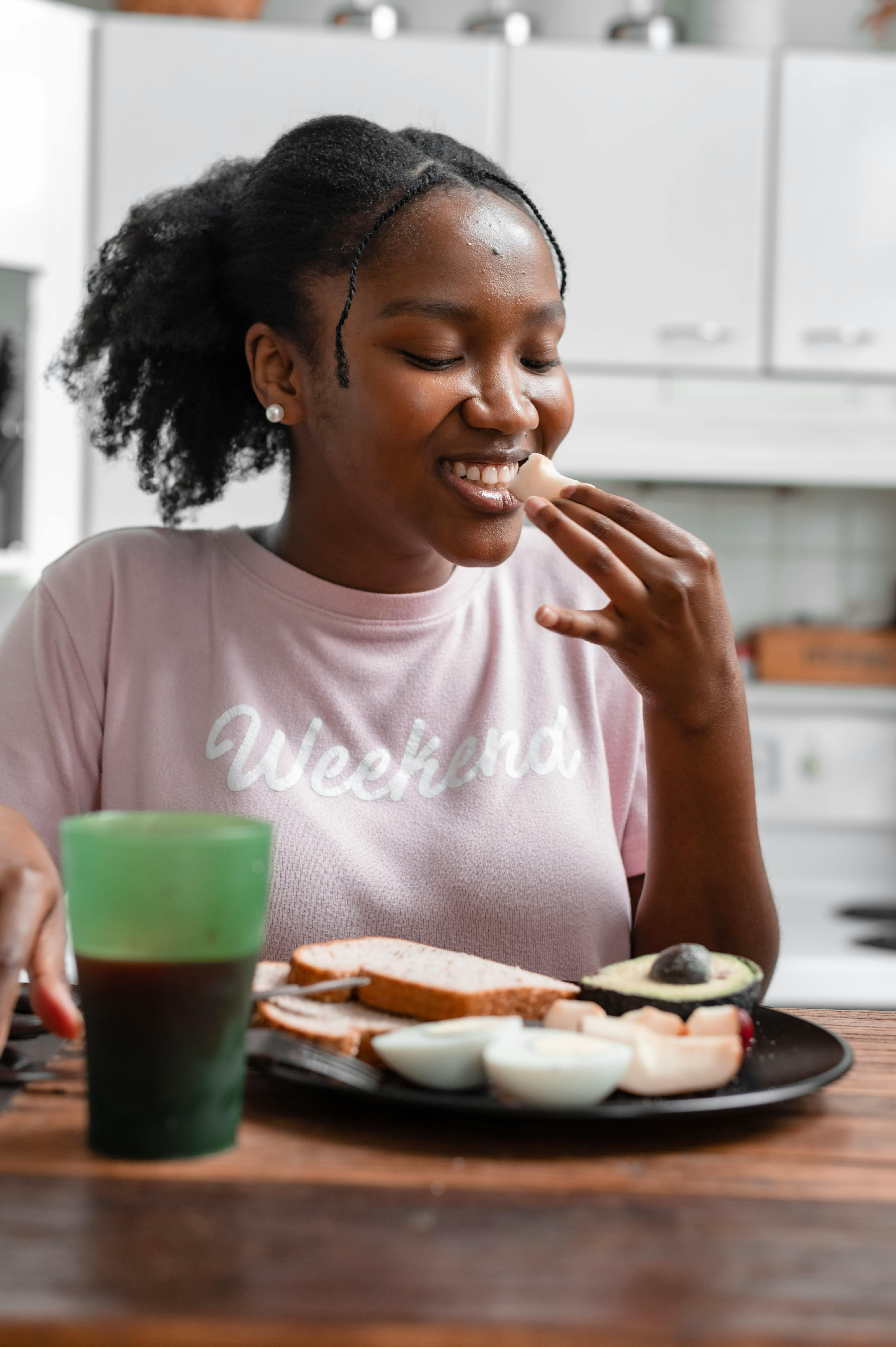 Smiling Woman Eating Healthy · Free Stock Photo
