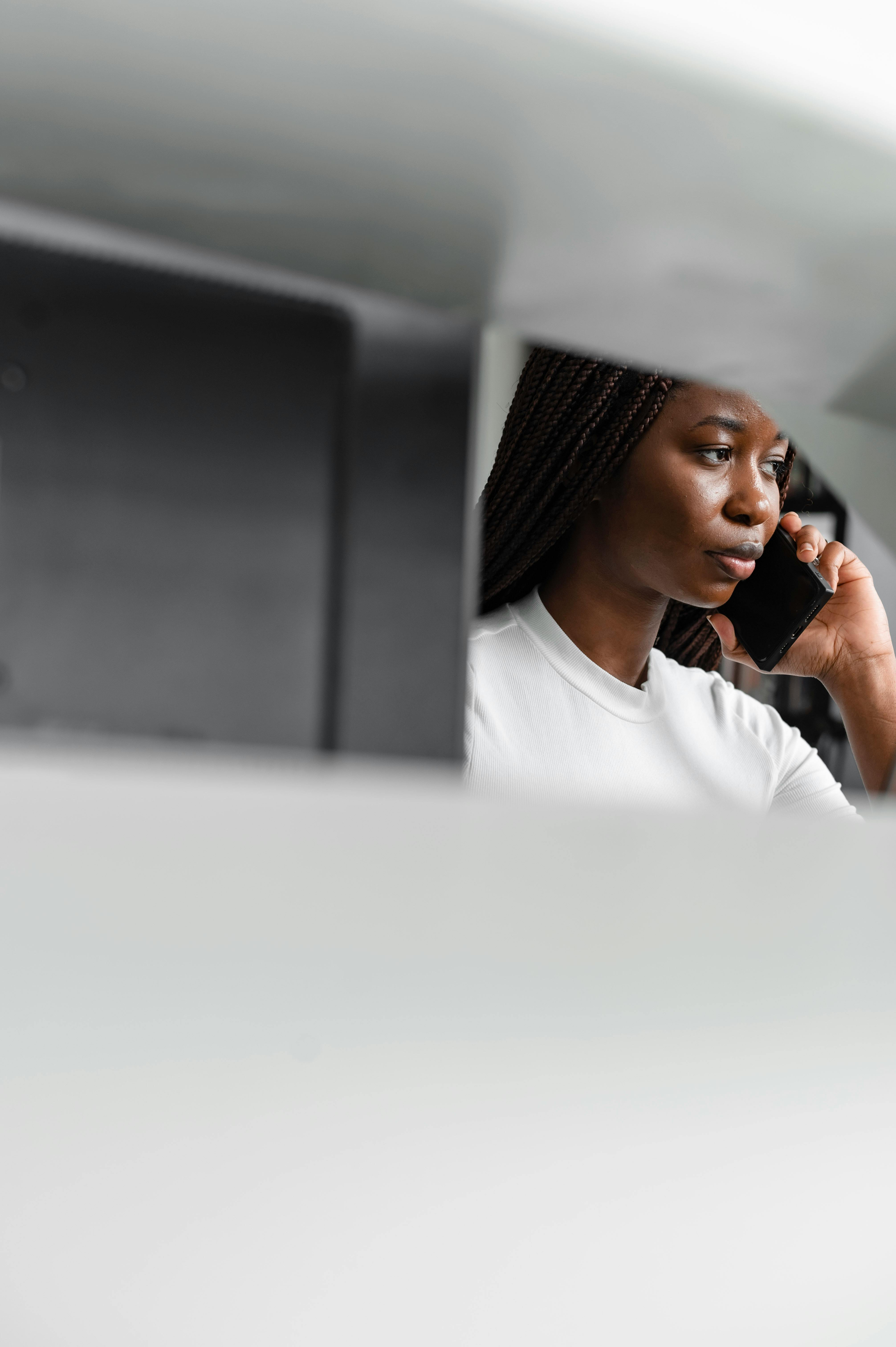 A Judge Reading a Document while Having a Phone Call · Free Stock Photo