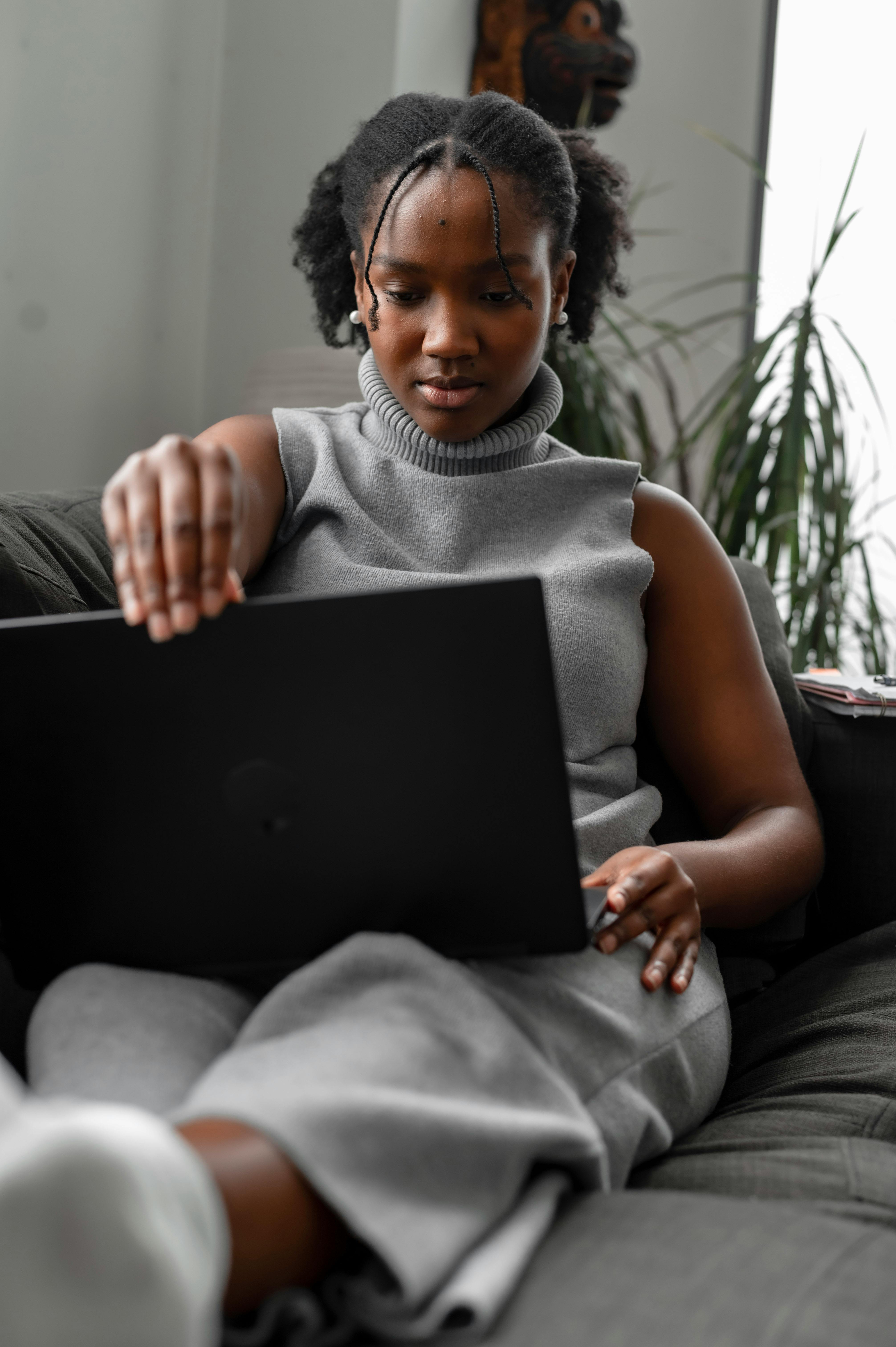 Woman Holding Her Laptop · Free Stock Photo