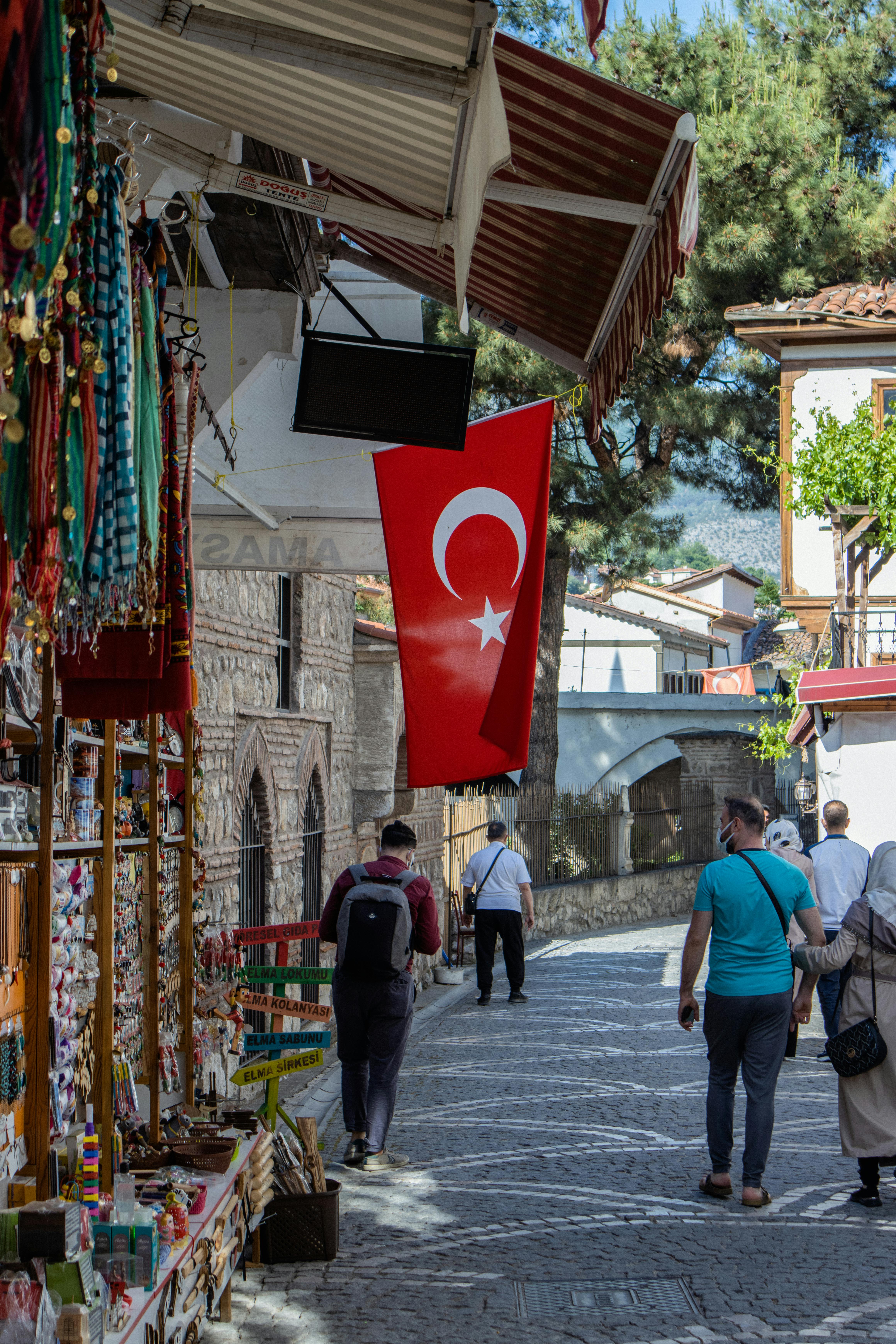 Flag on a Market Stall by a Street · Free Stock Photo