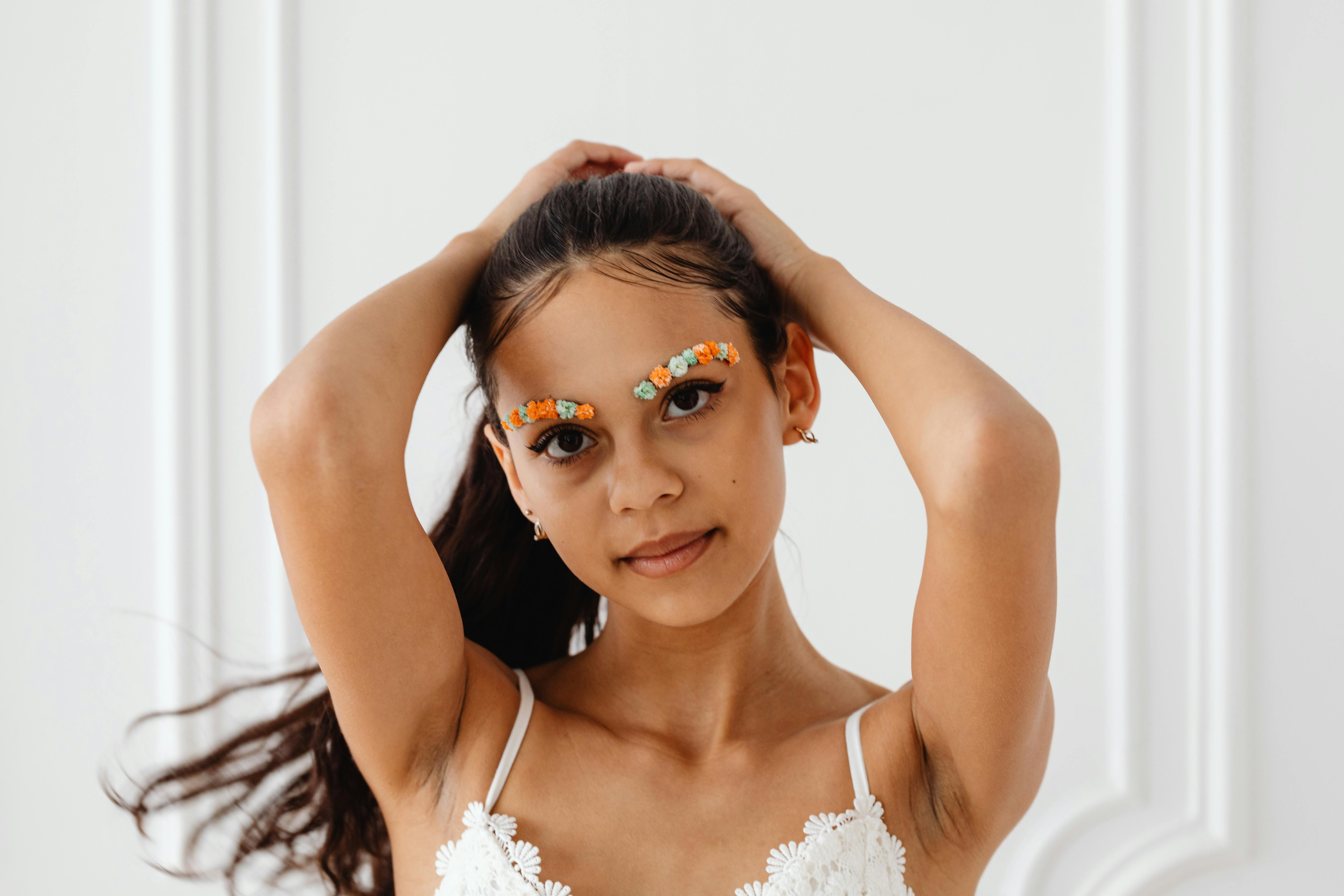 Woman With Flower Decoration on Eyebrows · Free Stock Photo