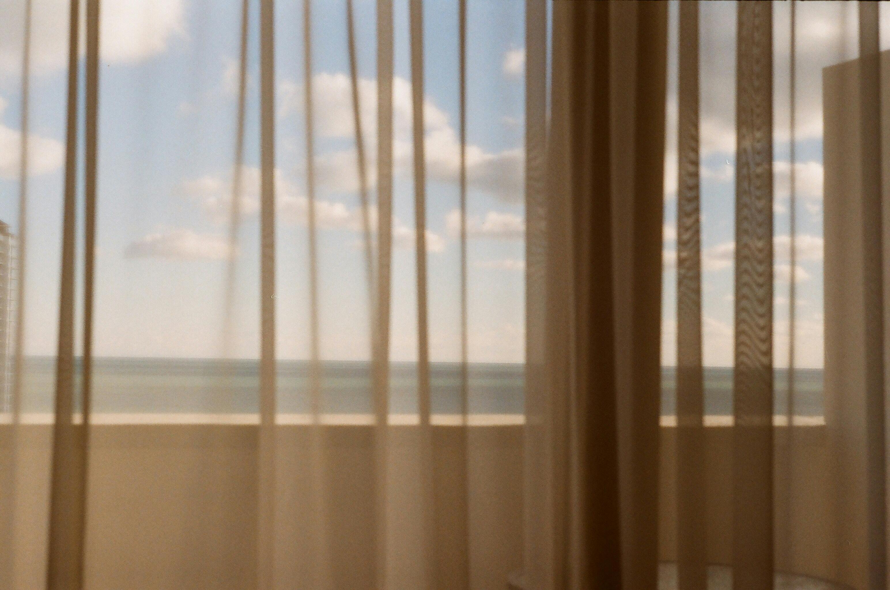 A Beige Window Curtain · Free Stock Photo