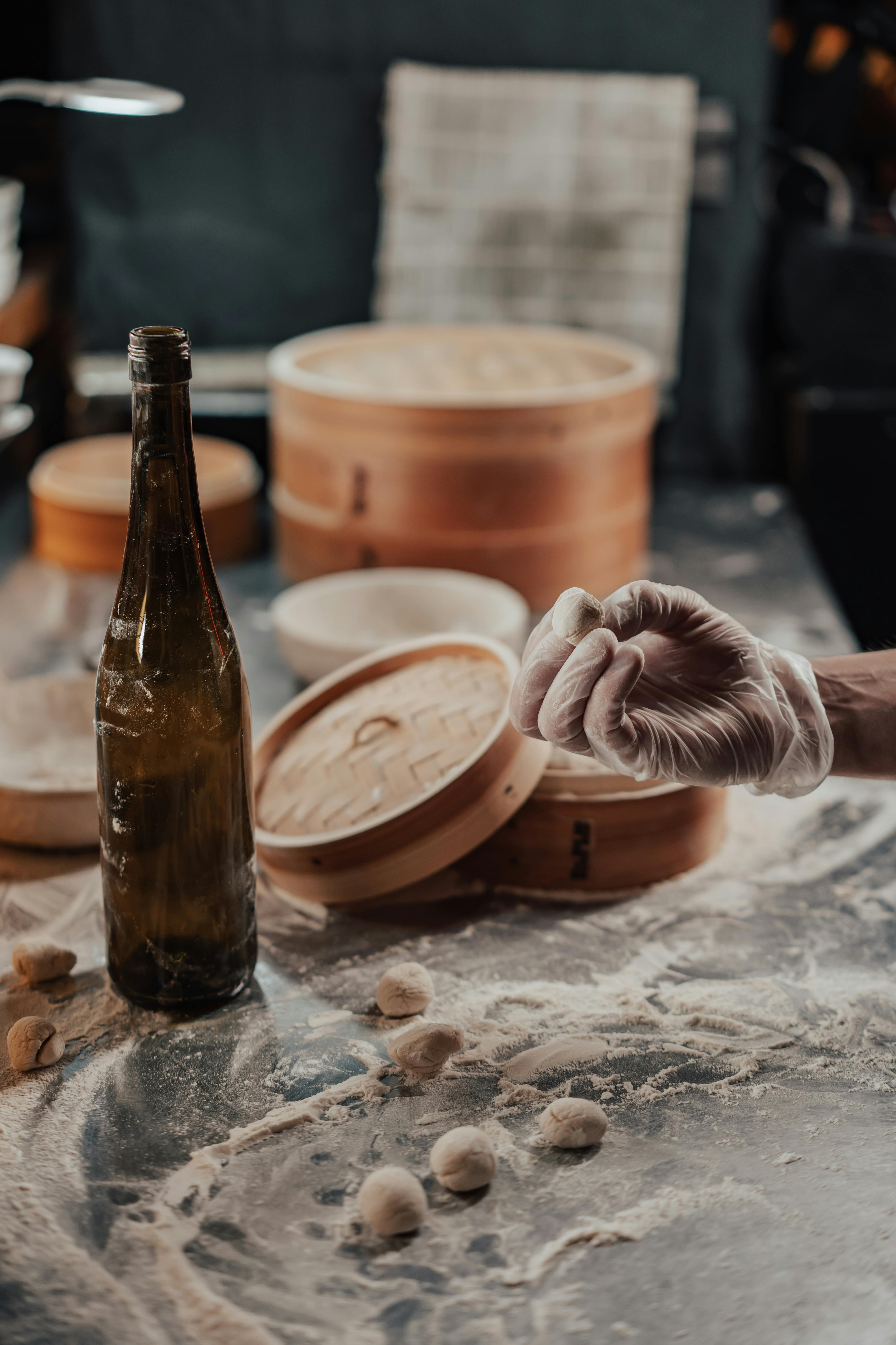 Close-up of a Chef Making Dim Sum Dumplings · Free Stock Photo