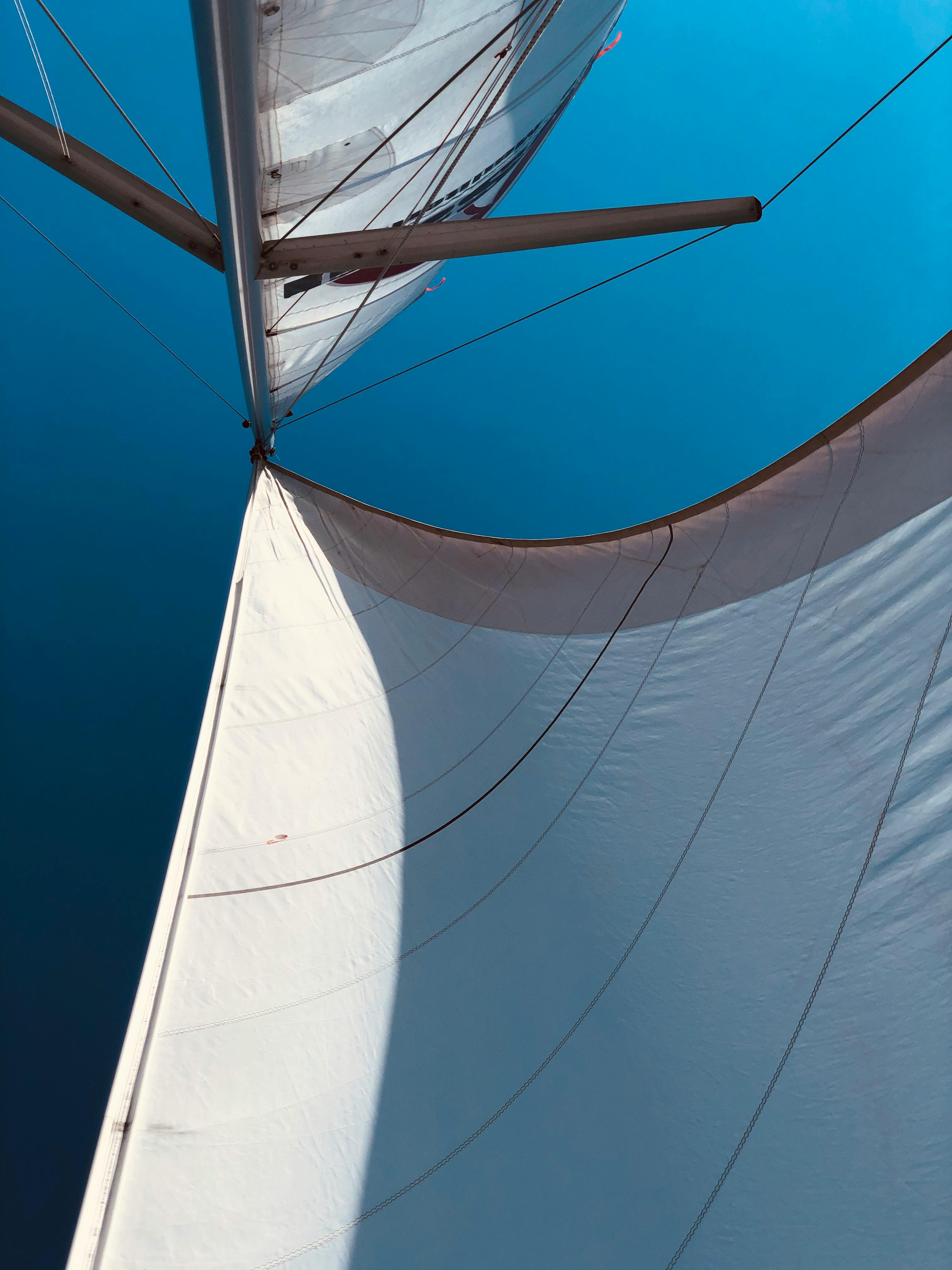 Mainsail of a Sailboat Under Blue Sky · Free Stock Photo