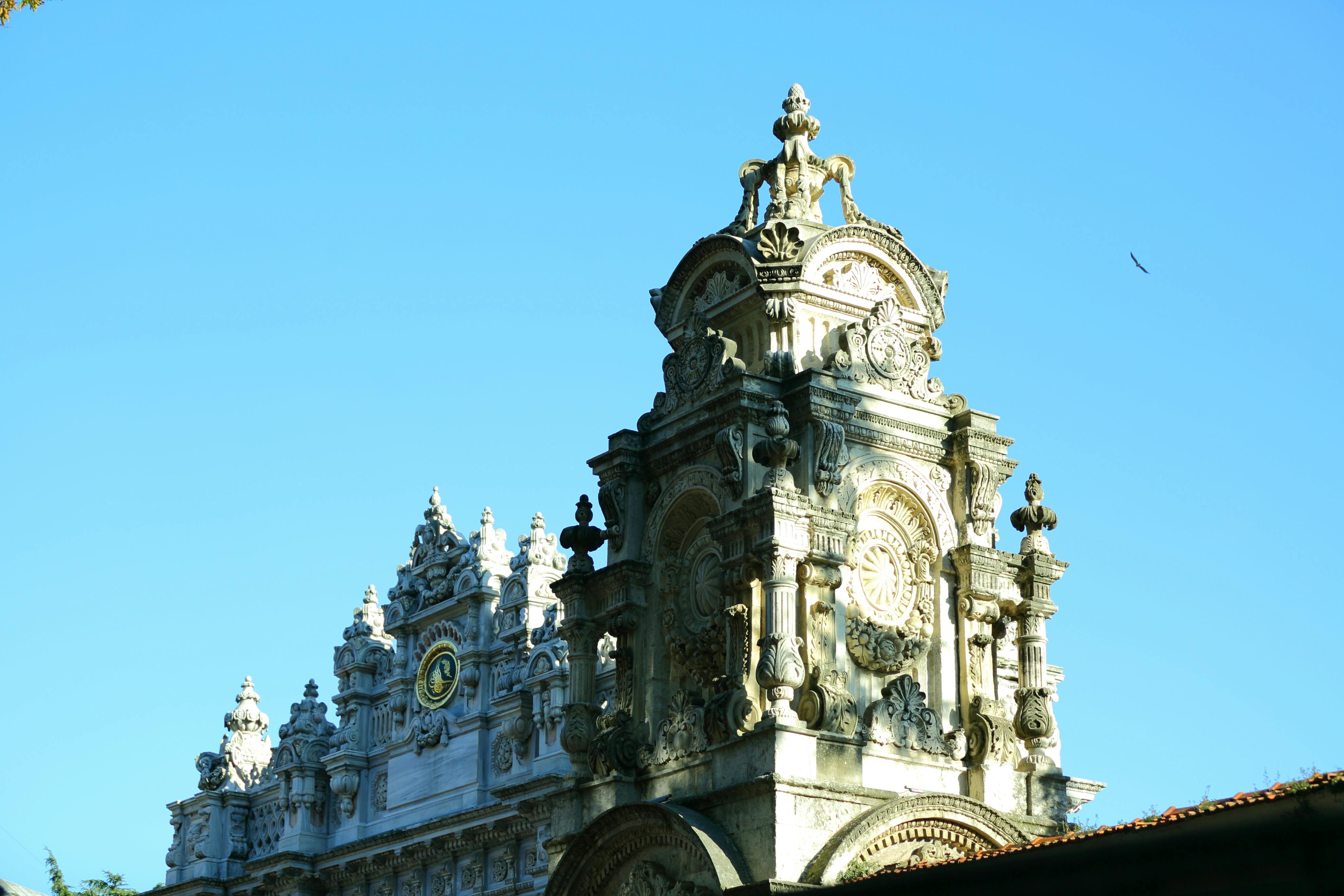 Ornate Sculptures on a Tower of a Building Against the Sky · Free Stock ...