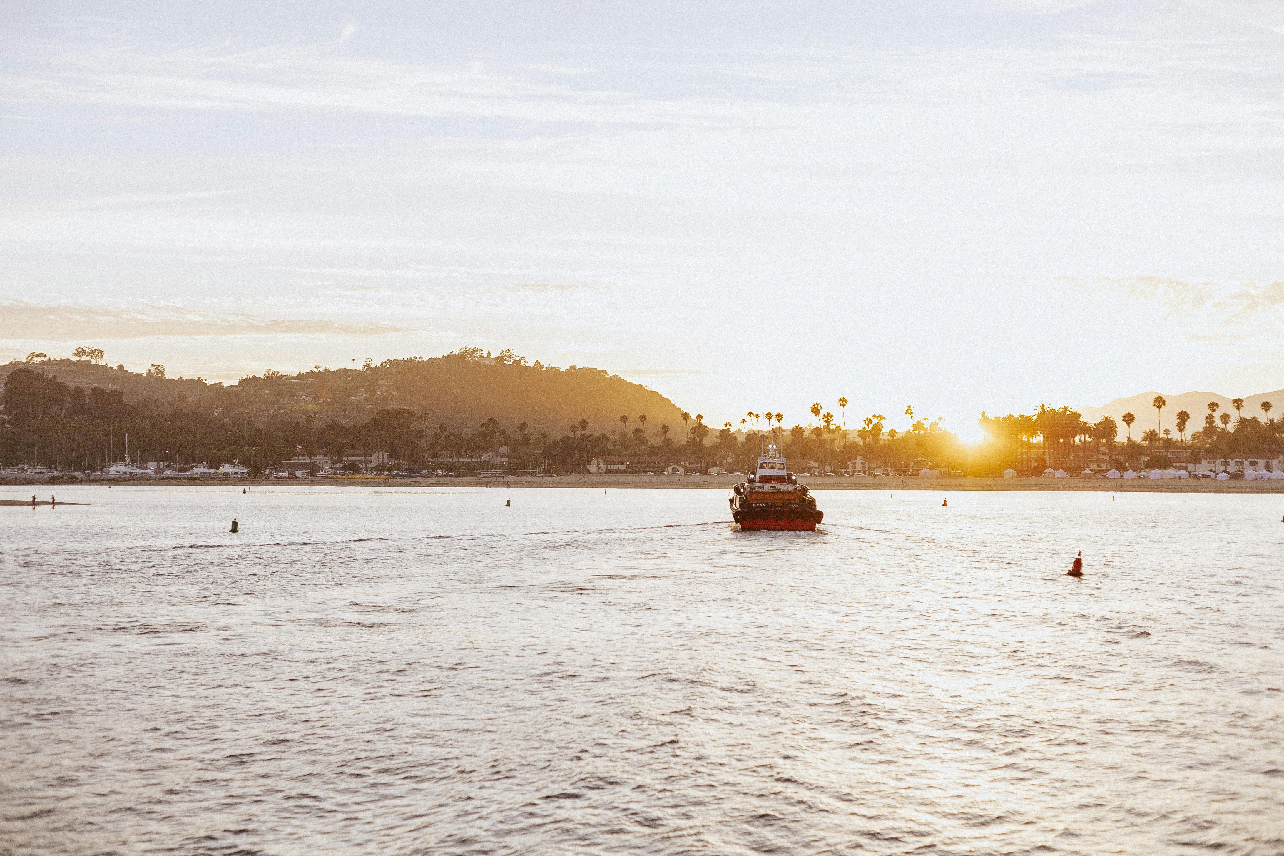 Ferry on Body of Water · Free Stock Photo