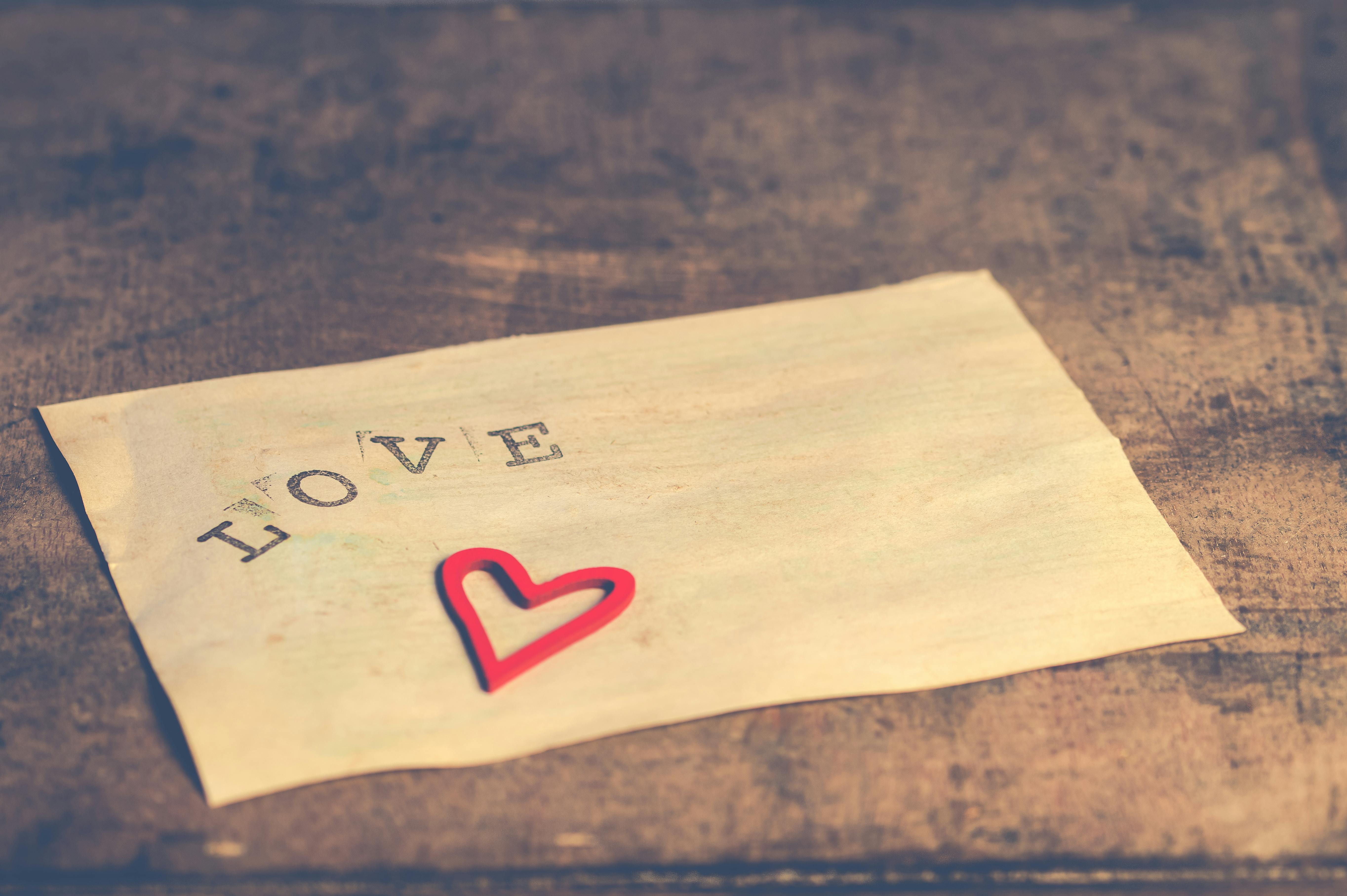 White Paper Printed With "love" · Free Stock Photo