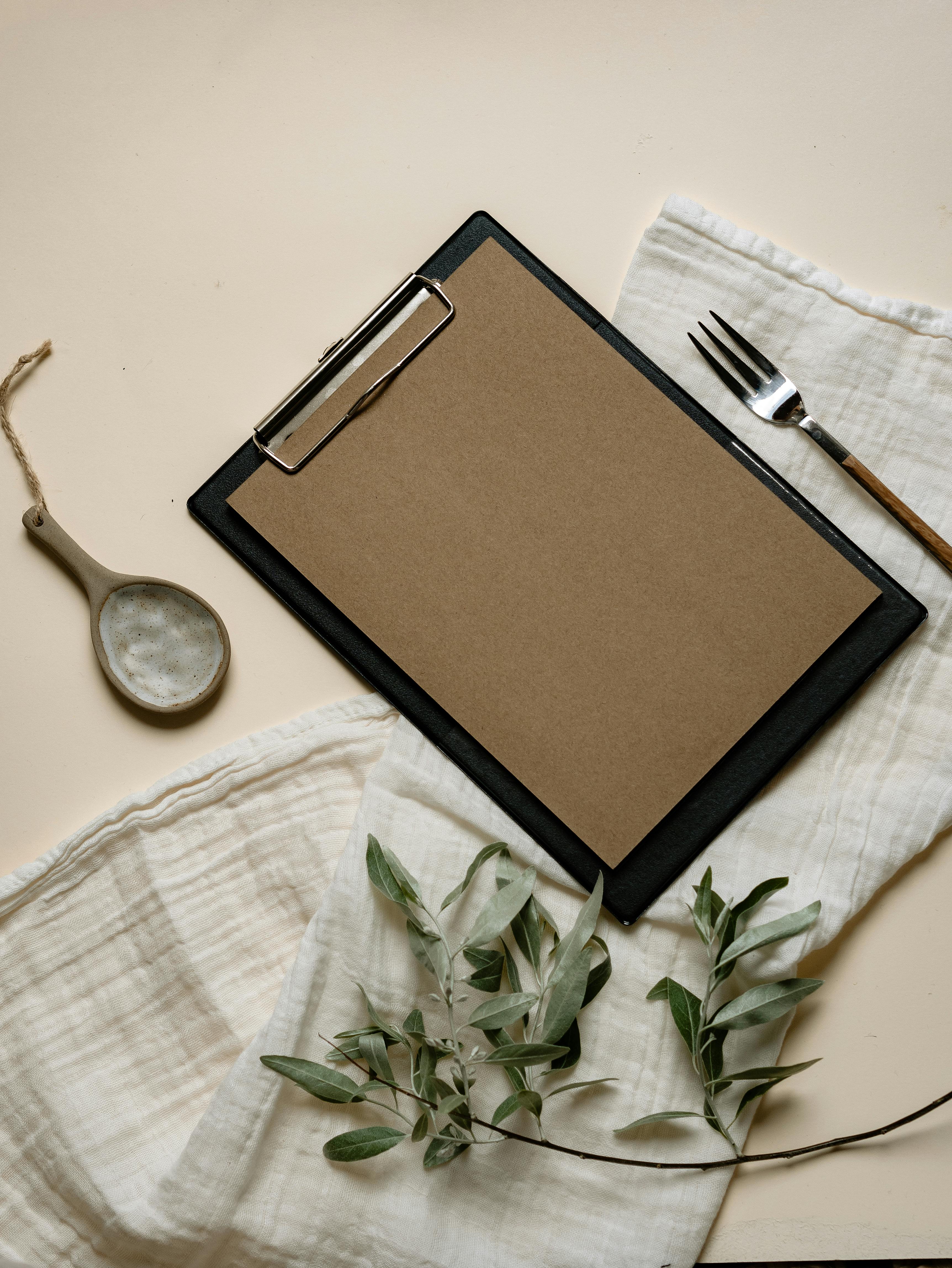 Leaves, Notepad and Fork · Free Stock Photo