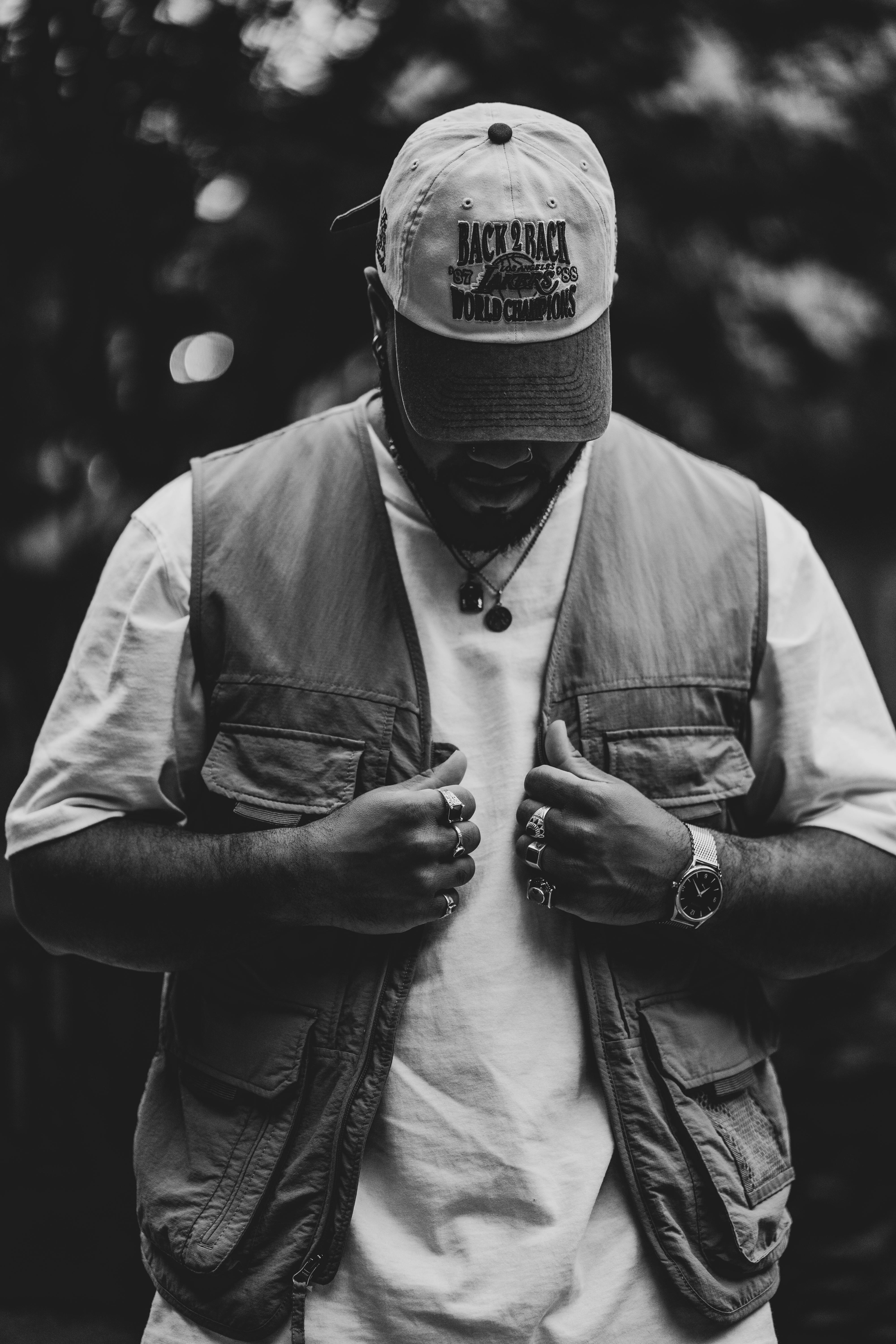 A Person wearing Cap and Vest · Free Stock Photo